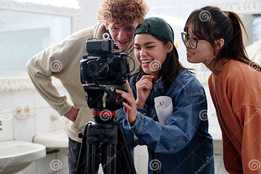 Examining Camera Settings during Collaborative Project Stock Image - Image of project ...