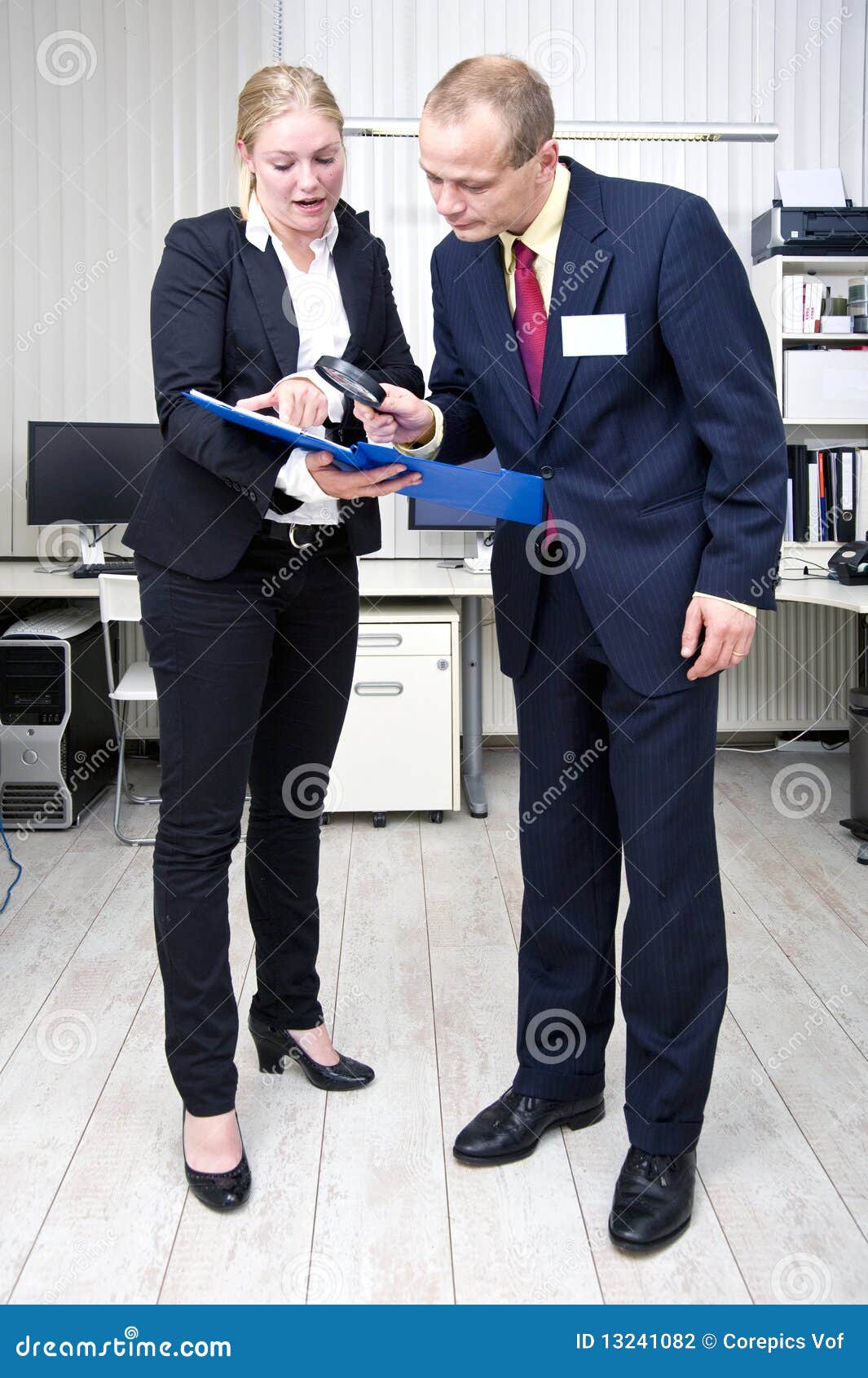Examining a document stock photo. Image of name, business - 13241082