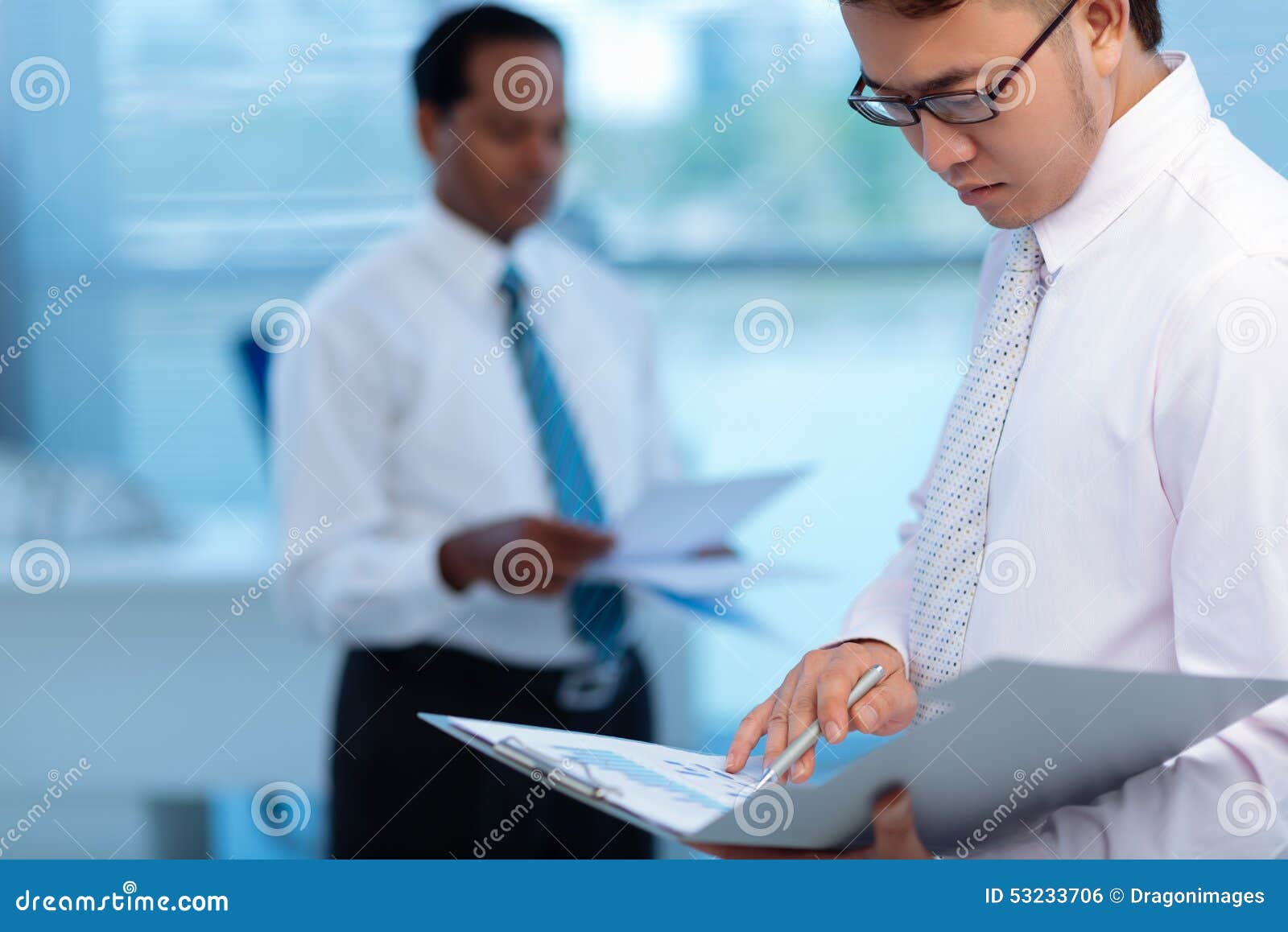 Examining document stock photo. Image of reading, concentrating - 53233706