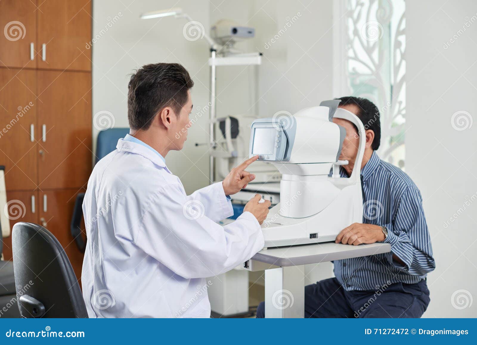 Examining patient stock photo. Image of healthcare, eyeground - 71272472