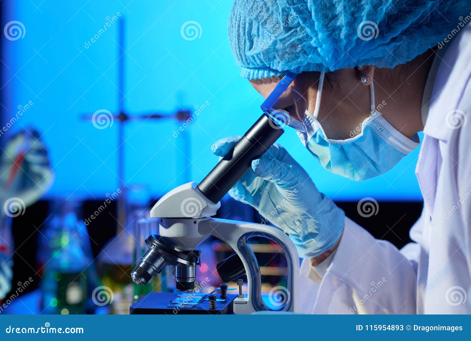 Examining Sample with Microscope Stock Image - Image of team, teamwork ...
