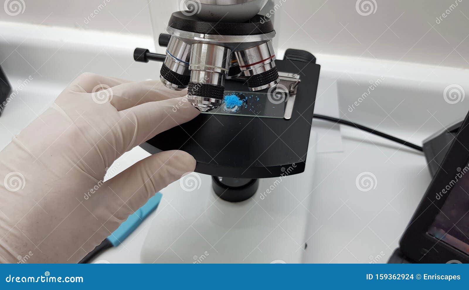 Examining a Sample Under a Microscope Stock Photo - Image of medicine ...