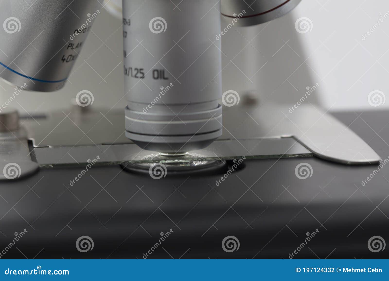 Examining of Test Sample Under the Microscope in Laboratory. Optical ...
