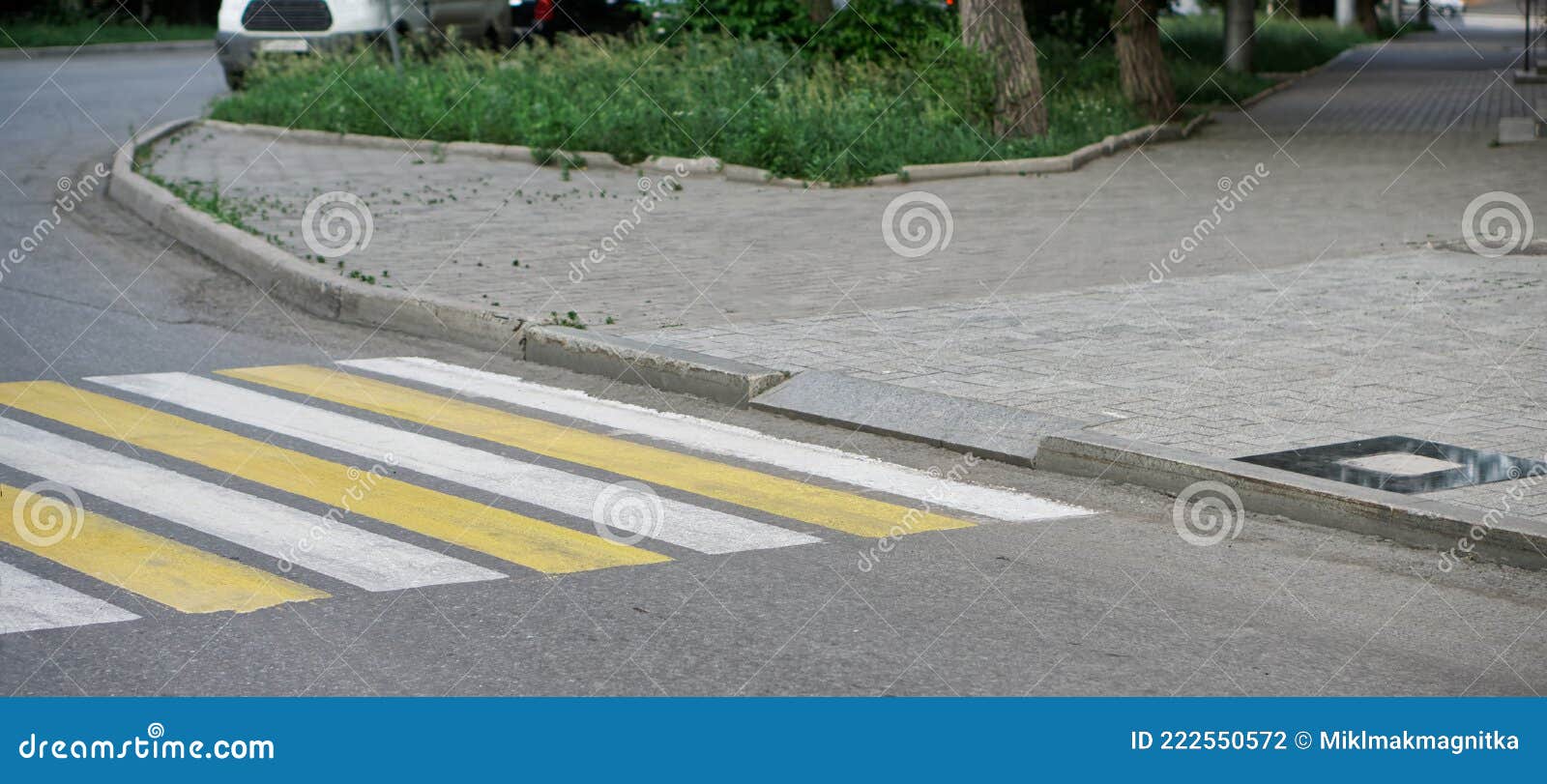An Example Of A Curb With An Equipped Wheelchair Ramp And Exit To A ...