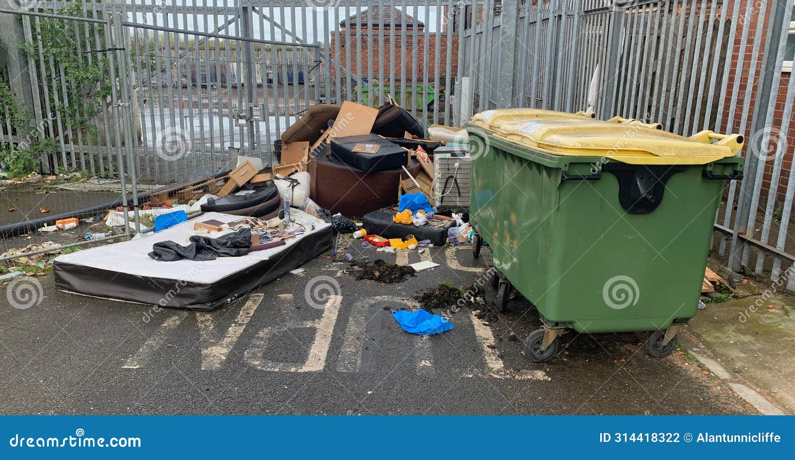 An Example of Fly Tipping in a Town Stock Photo - Image of pollution ...