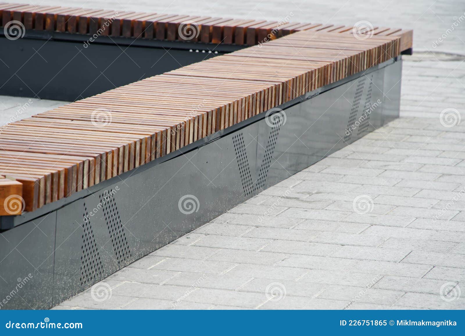 An Example of Installing a Modern Corner Bench in an Urban Space. Alley ...