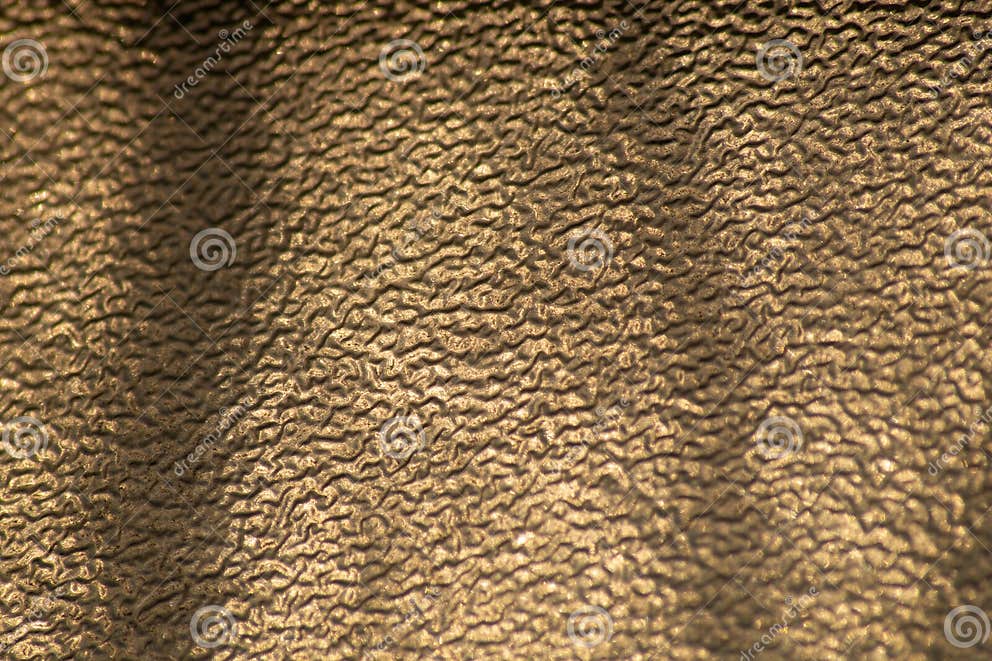 An Example of the Surface of Embossed Glass Under Natural Sunlight. a ...