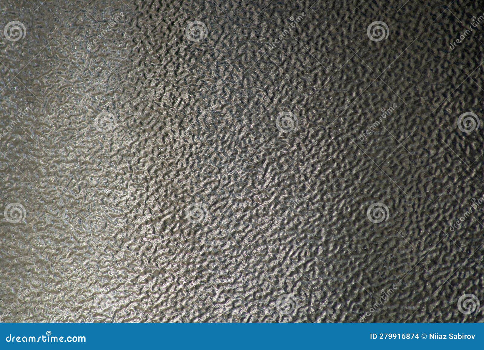 An Example of the Surface of Embossed Glass Under Natural Sunlight. a ...