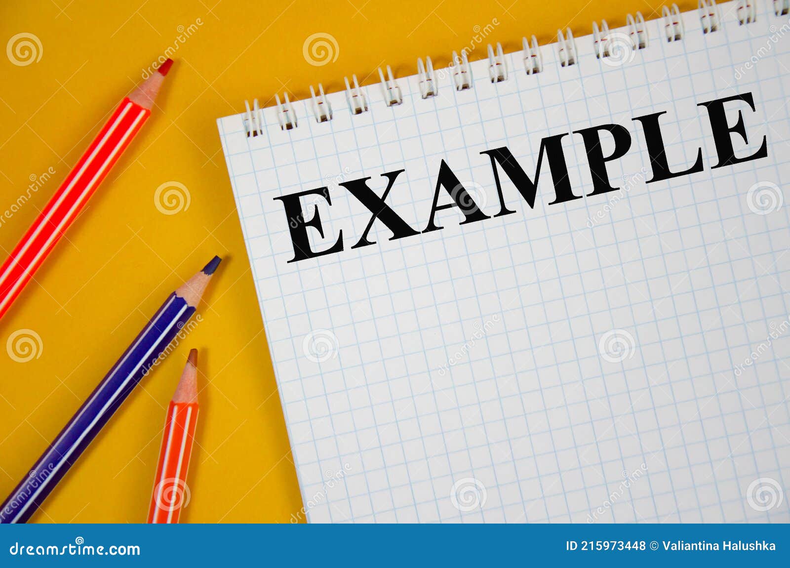 Example Word Written on White Notepad and Yellow Background Stock Photo ...