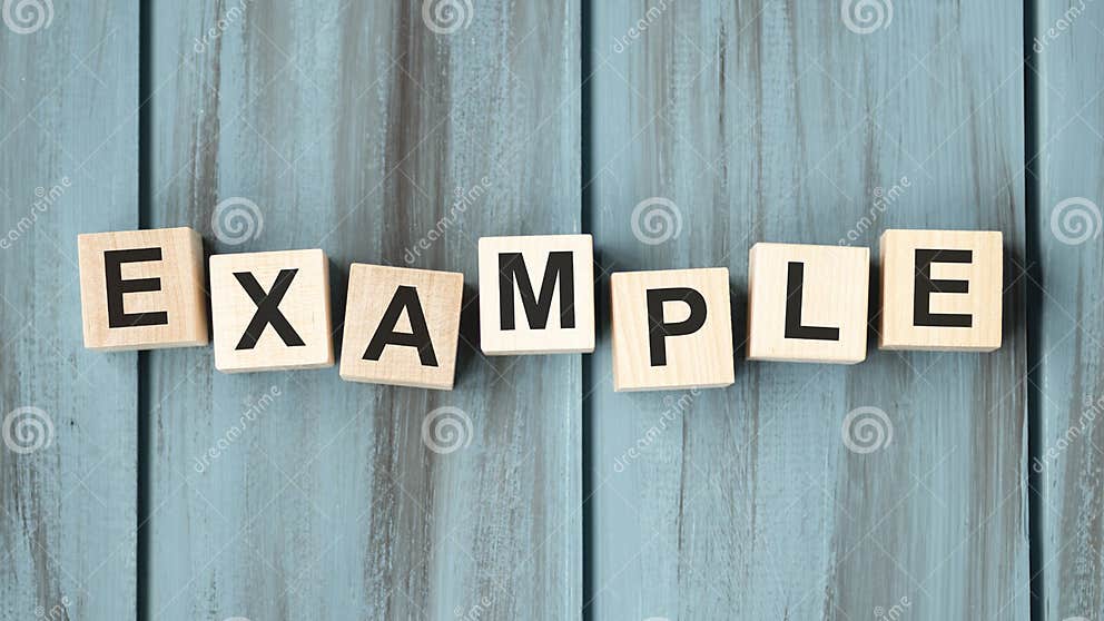 Examples Word Written on Wood Block. Examples Text on Table Stock Image ...