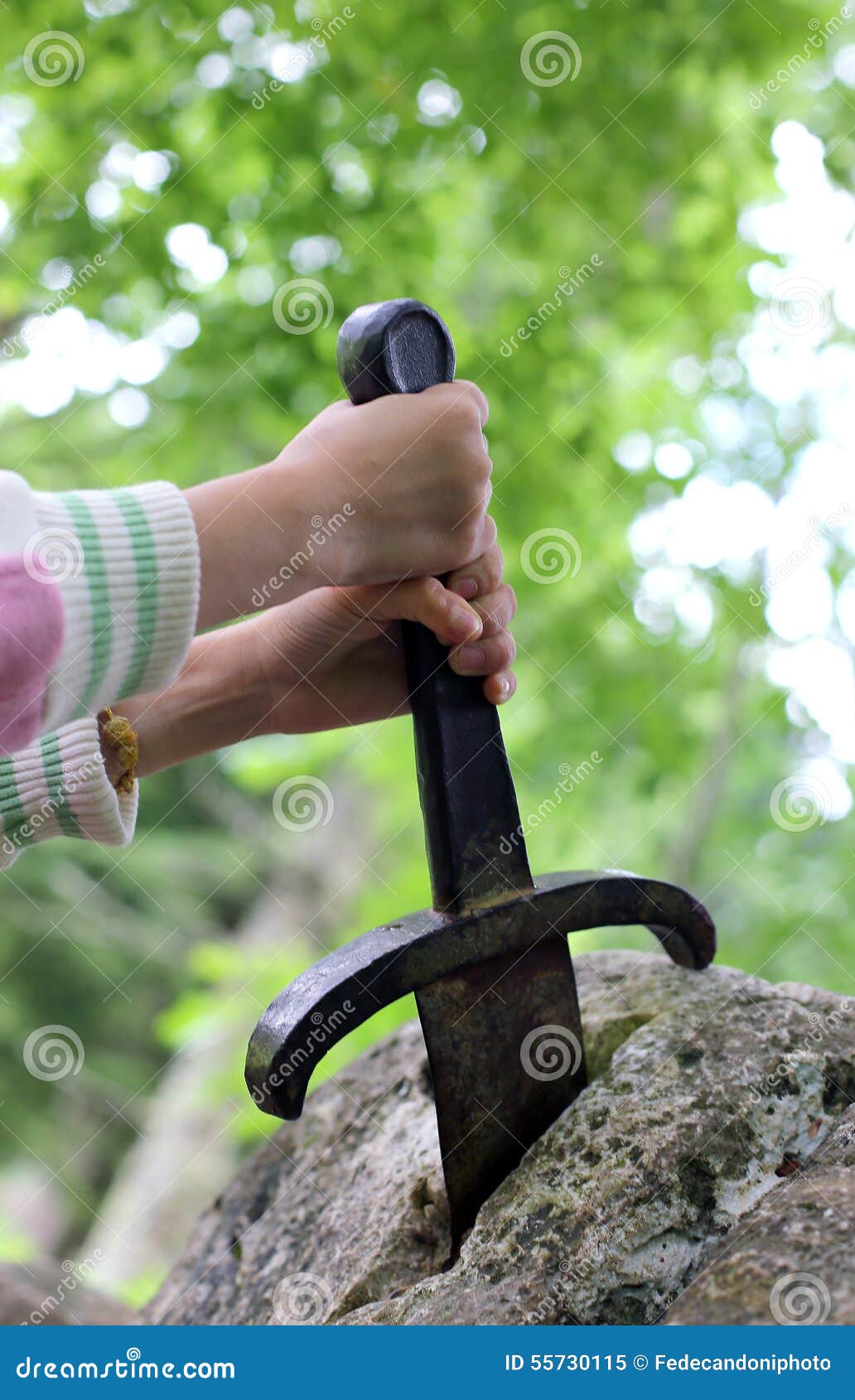 Excalibur The Famous Sword In The Stone Of King Arthur Stock ...