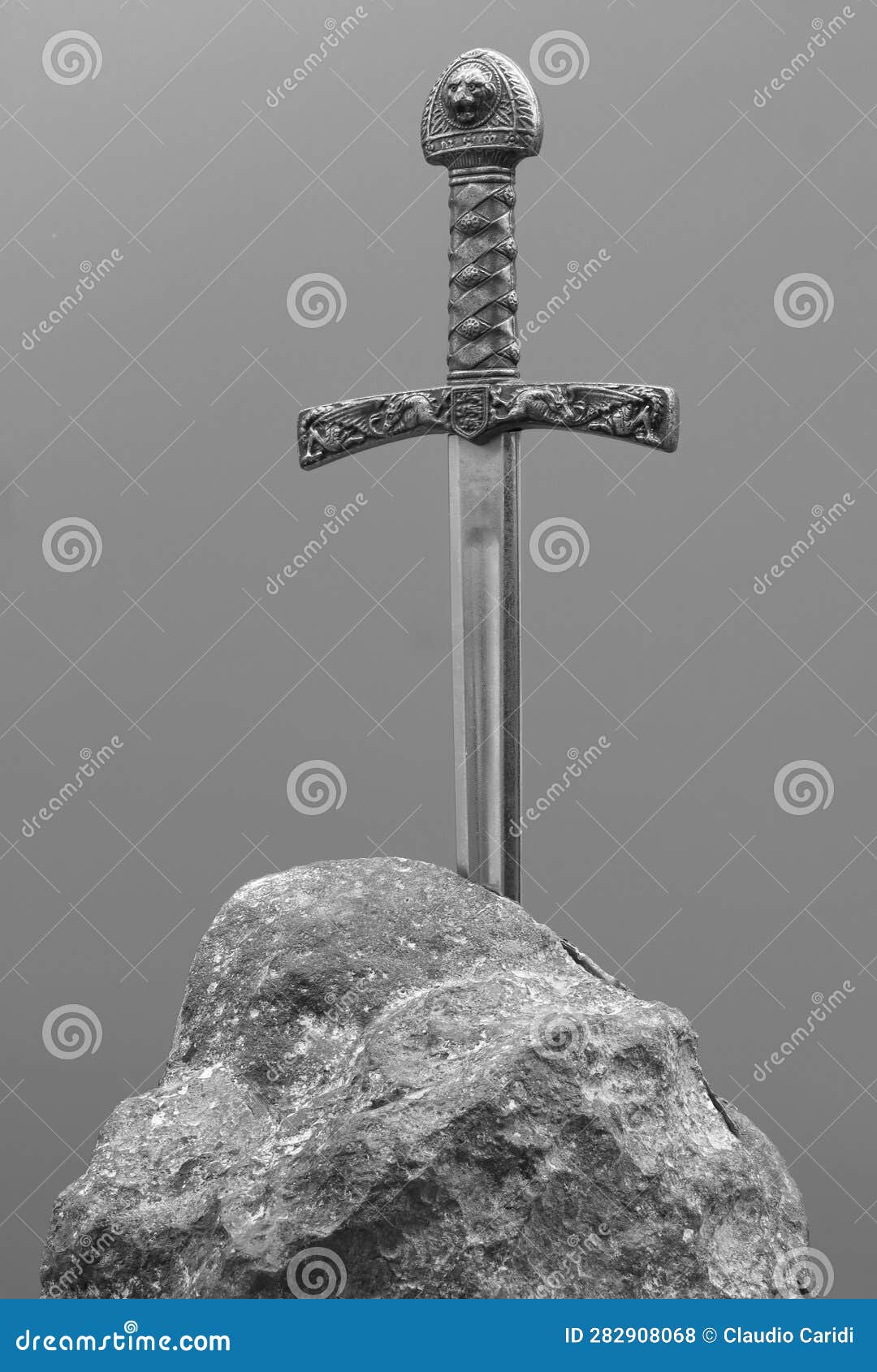 Excalibur, the Mythical Sword in the Stone of King Arthur Stock Photo ...