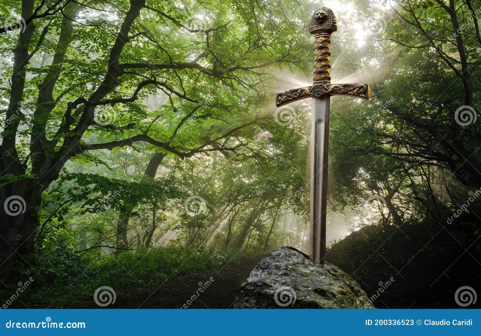 Excalibur, the Mythical Sword in the Stone of King Arthur. Stock Image ...