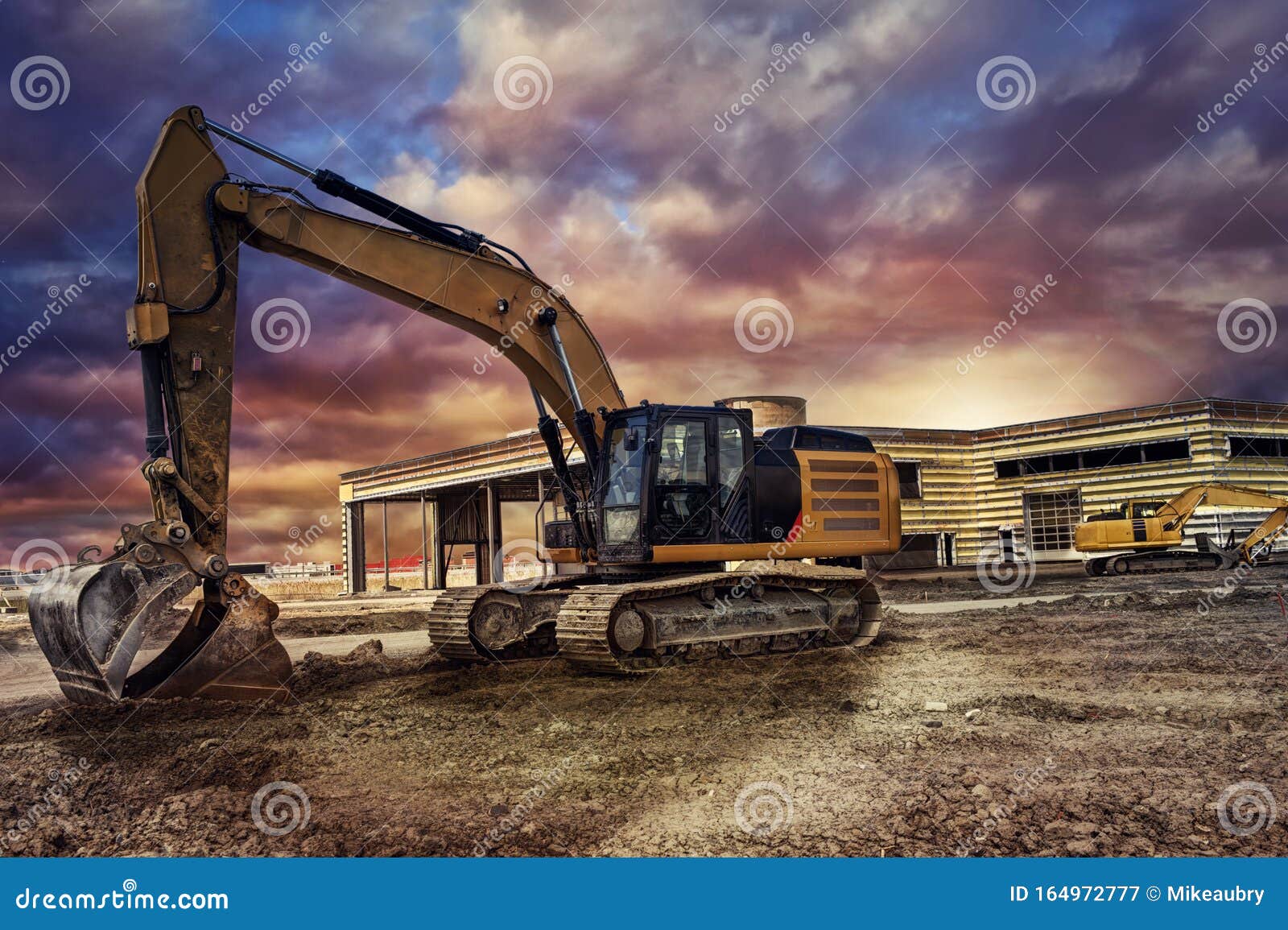 Excavating Machinery at the Construction Site. Stock Image - Image of ...