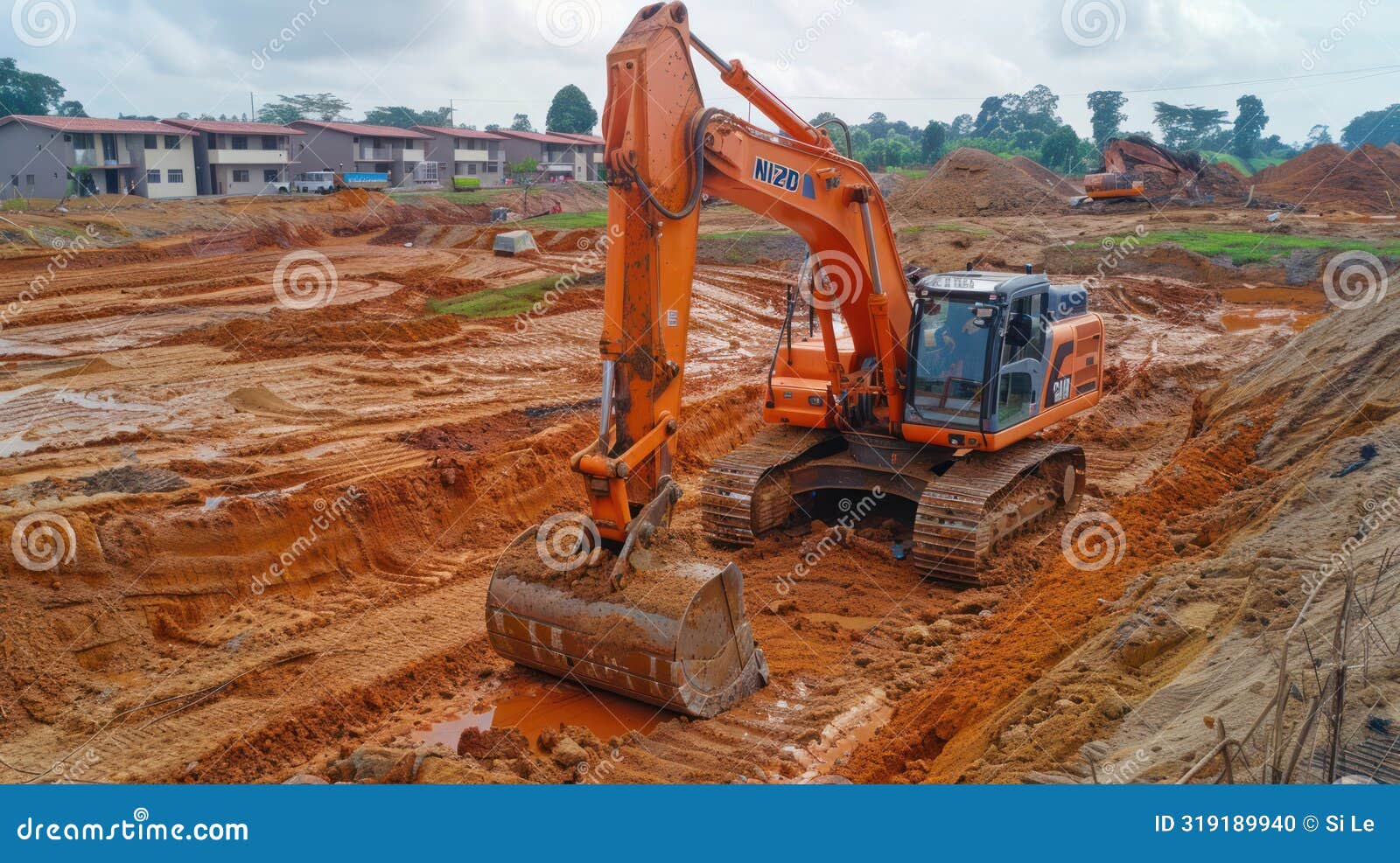 Excavation at Construction Site: Backhoe and Crawler Excavator Digging ...