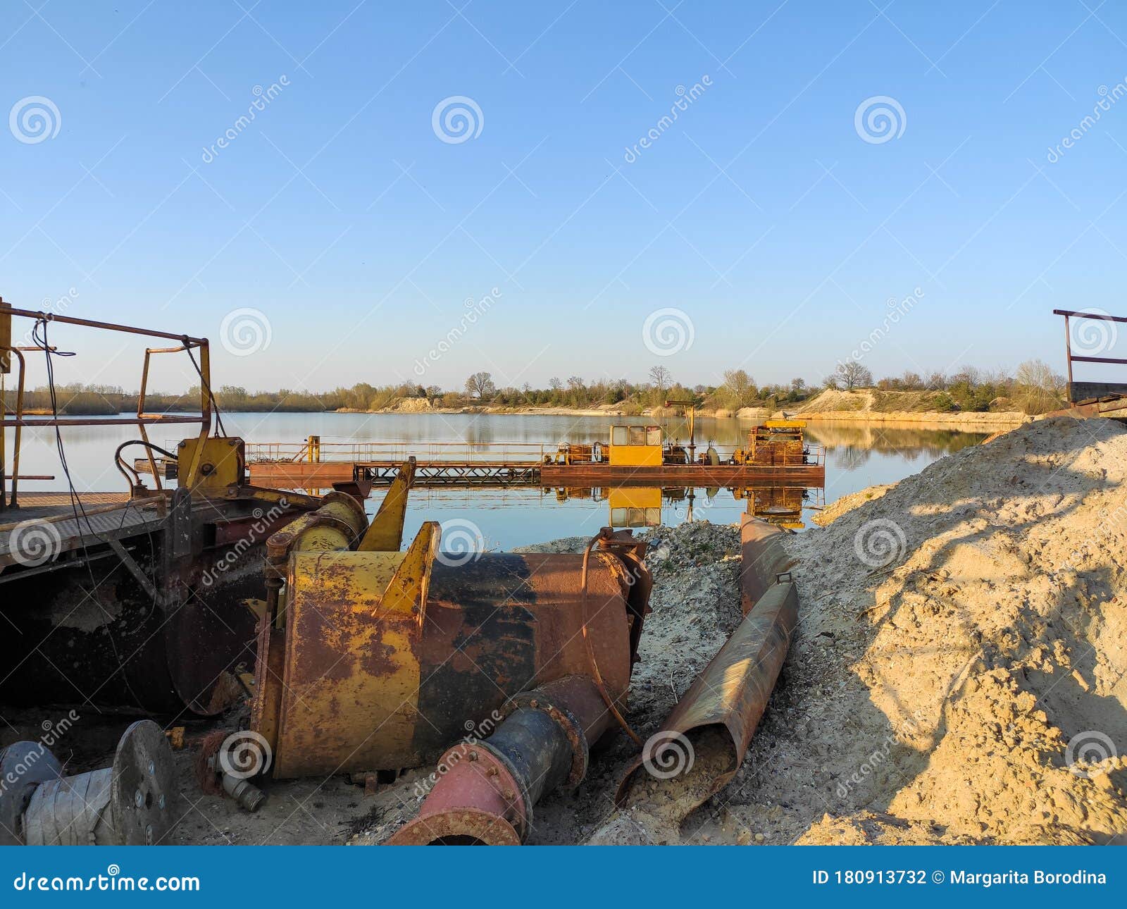 Excavation Machine at Earthmoving Work in Sand Quarry. Extraction of ...