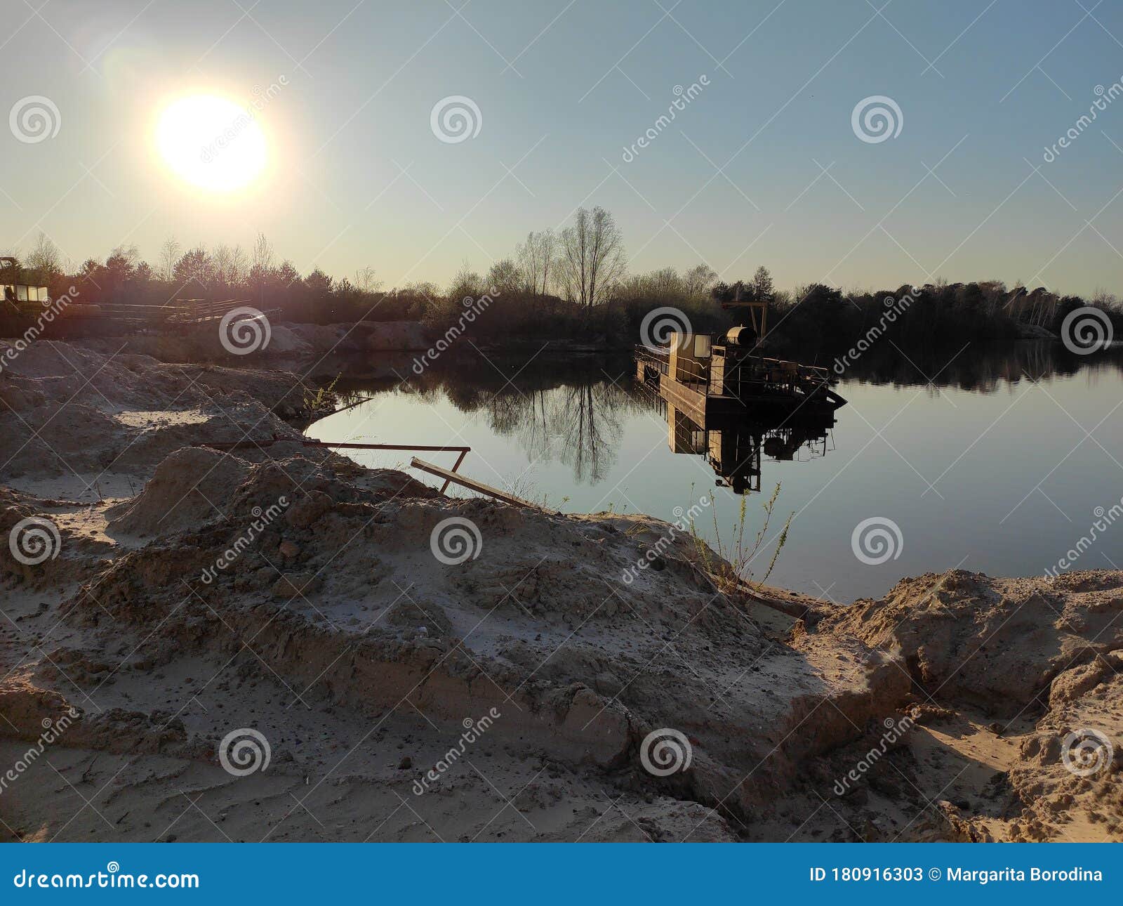 Excavation Machine at Earthmoving Work in Sand Quarry. Extraction of ...