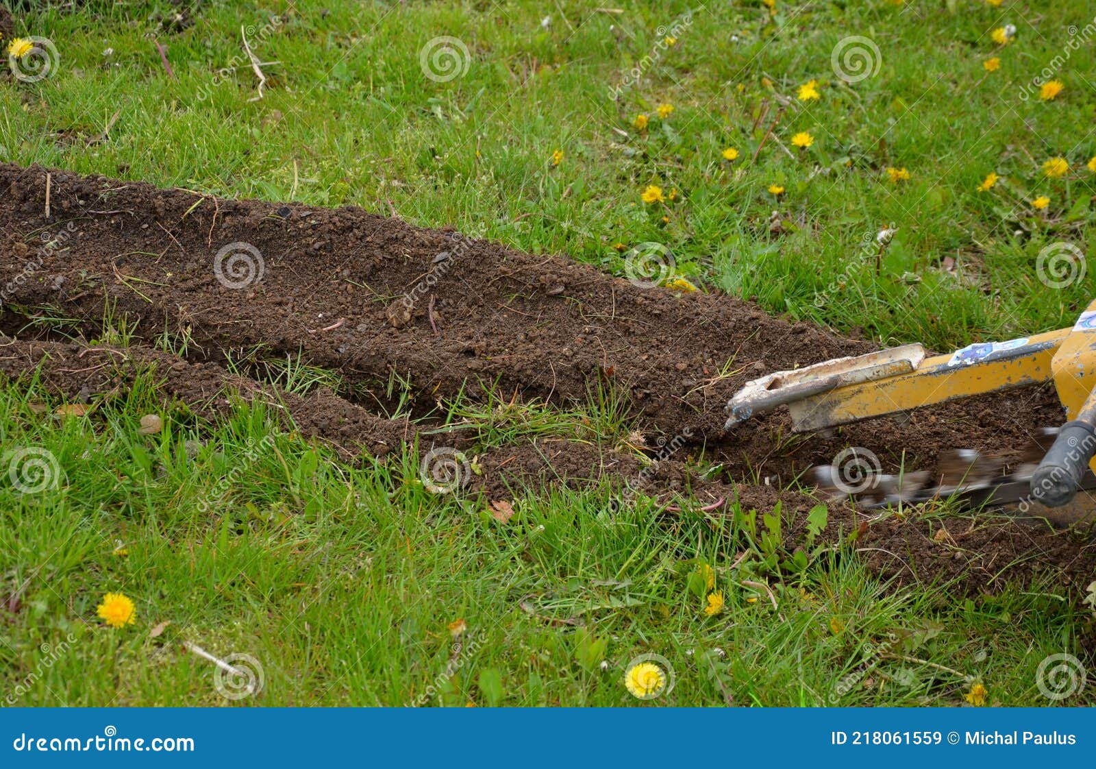 Excavation Work in the Garden or Park. Installation of Automatic ...