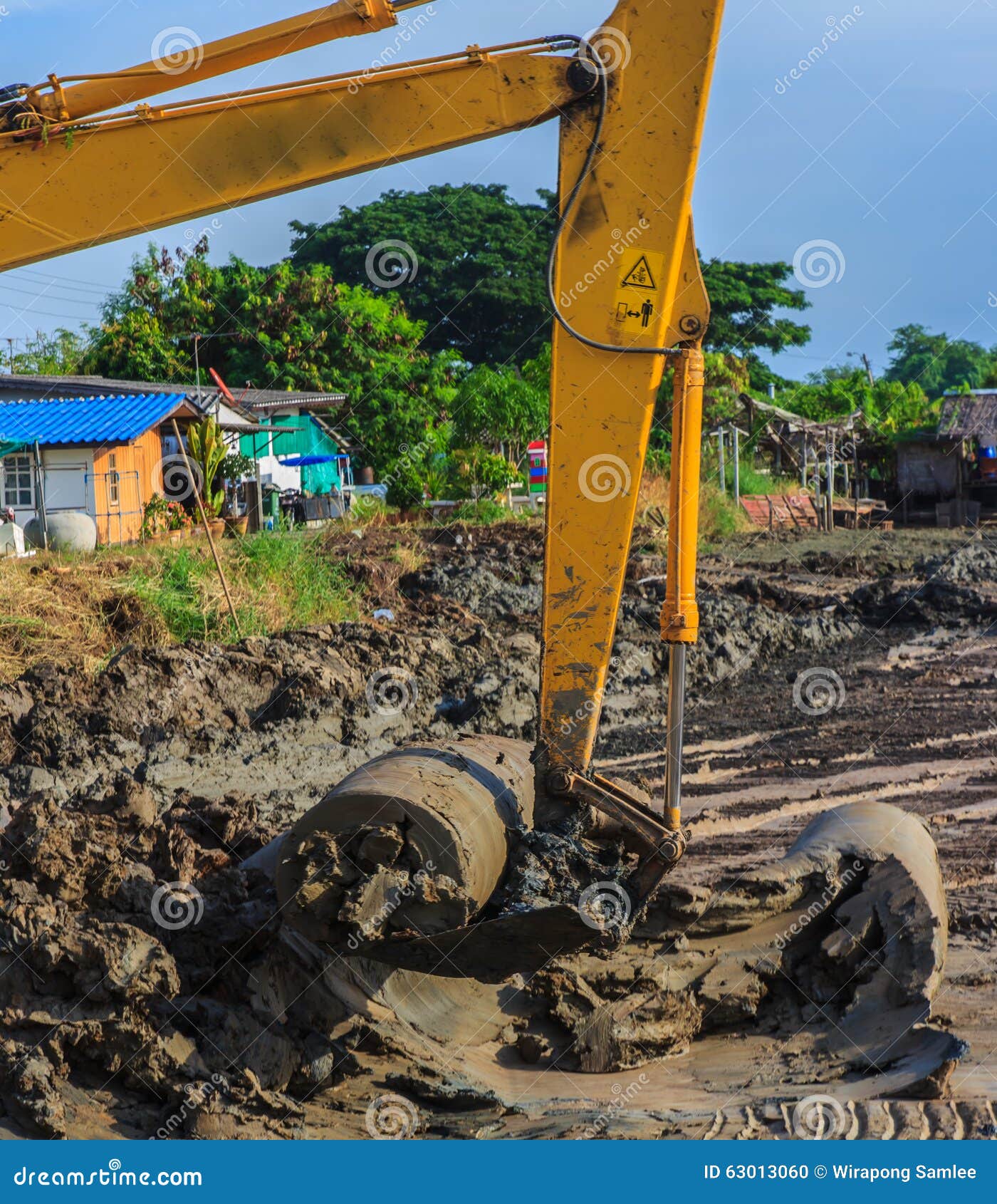 Excavator in action stock photo. Image of mover, road - 63013060