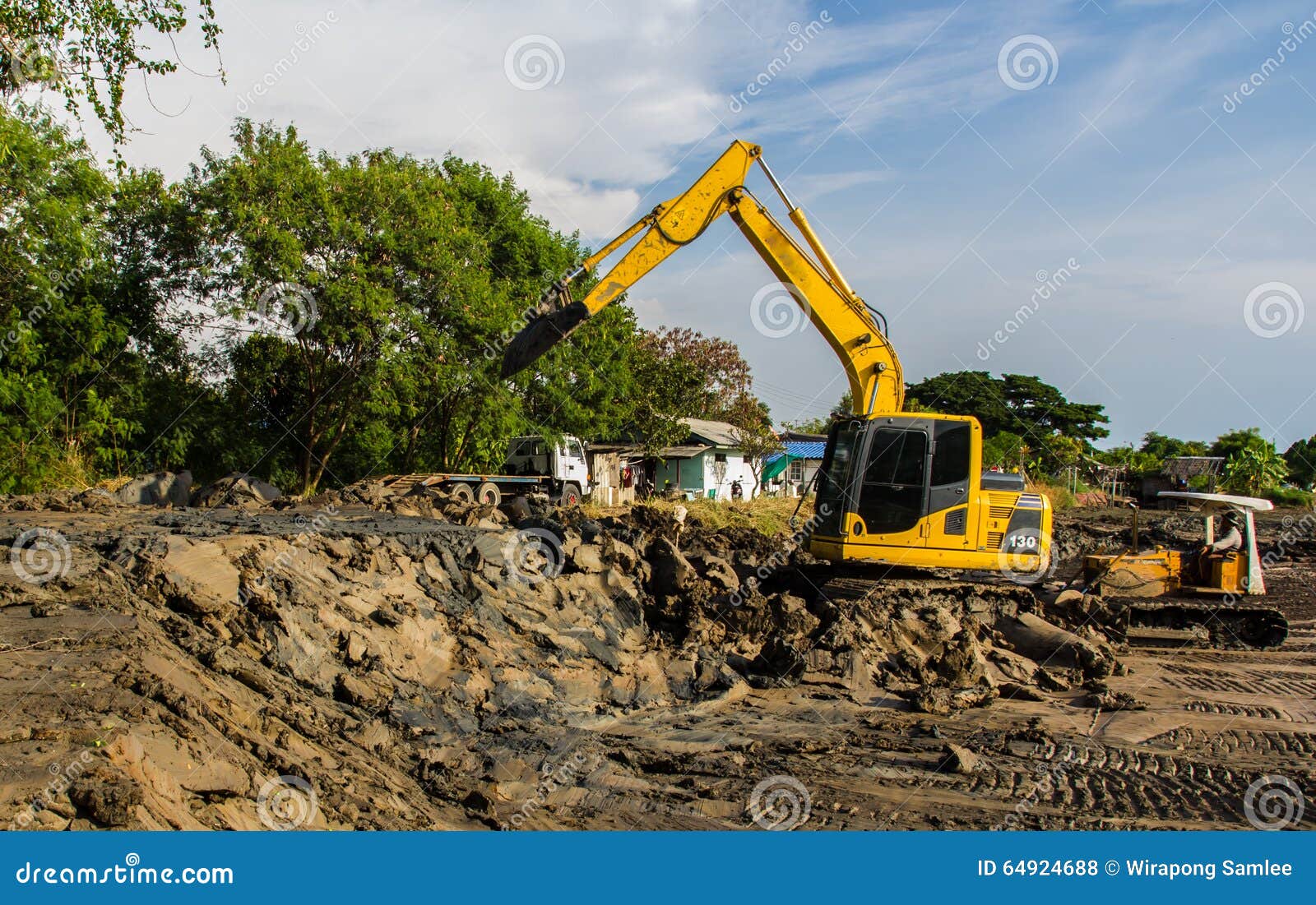Excavator in action stock photo. Image of backhoe, outdoors - 64924688