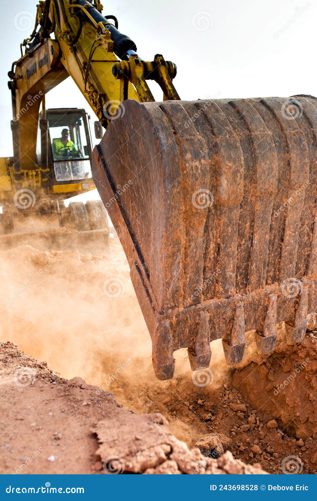 Backhoe Digging in Dust Close Up Stock Photo - Image of site, action ...