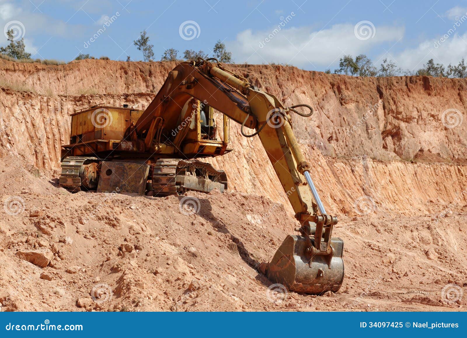 Excavator in action stock image. Image of digger, machine - 34097425