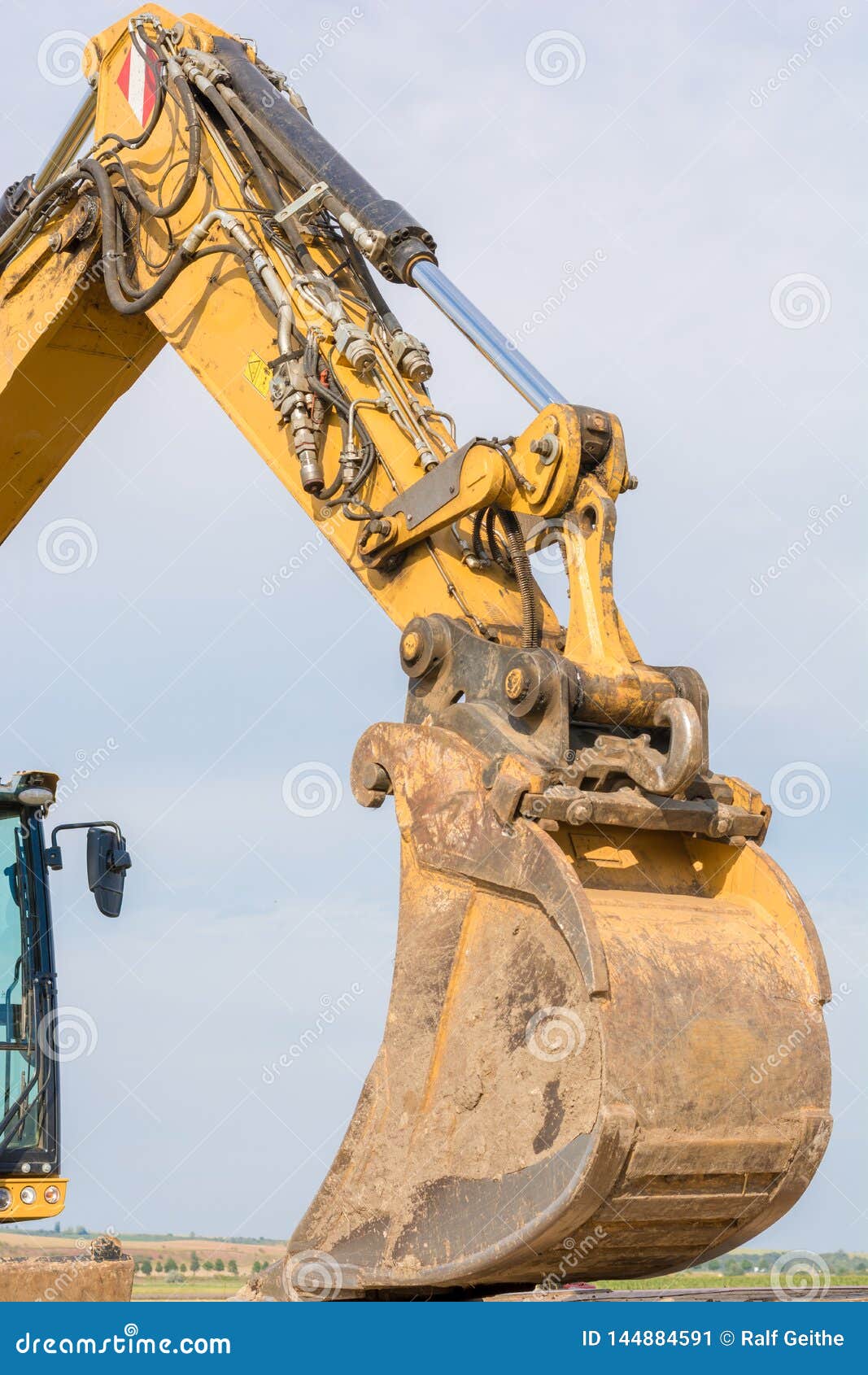 Excavator arm with backhoe stock image. Image of driver - 144884591