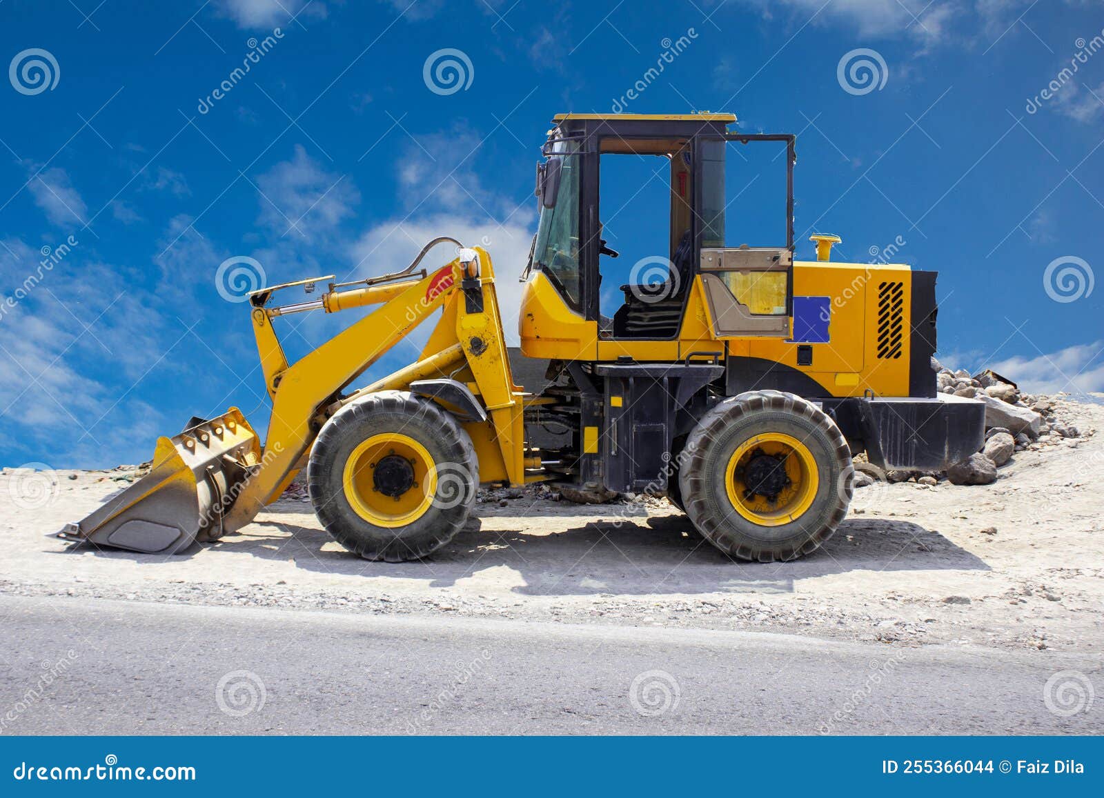 Excavator or Backhoe on Construction Site and Sky Background. Stock ...