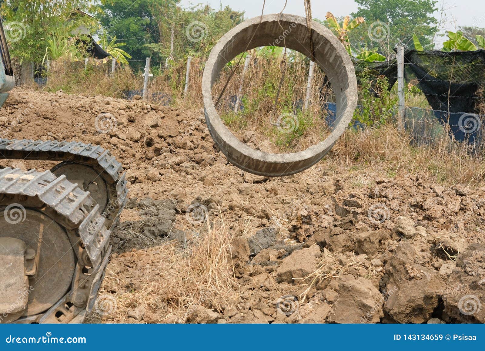 Excavator Backhoe Raising Pipe at Construction Site Stock Image - Image ...