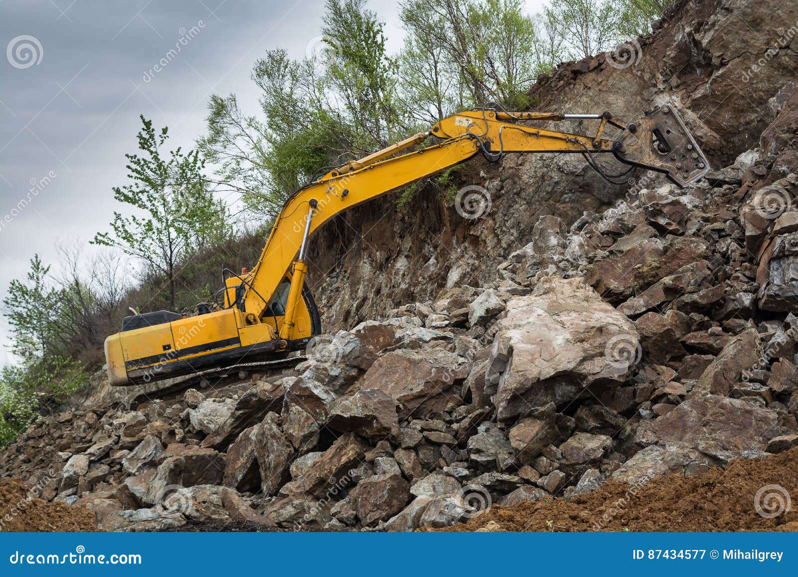 Excavator Behind the Slope. Stock Image - Image of construction ...