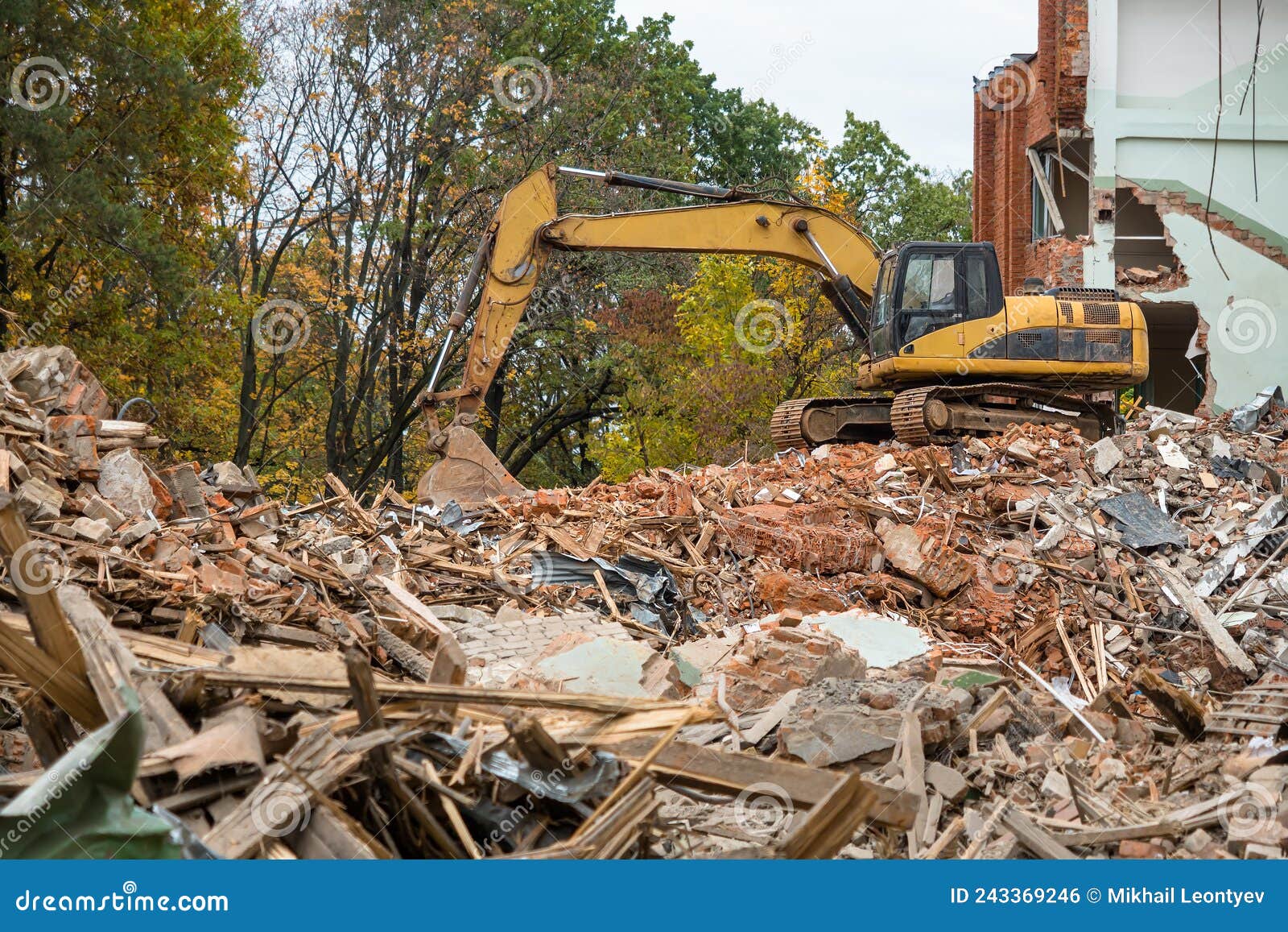 Excavator on Big Pile of Debris Stock Photo - Image of wreck, rubble ...