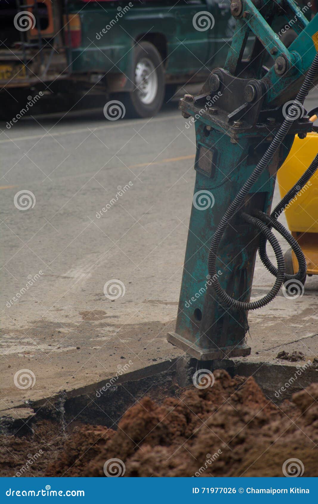 Excavator Breaking and Drilling the Concrete Road. Stock Photo - Image ...