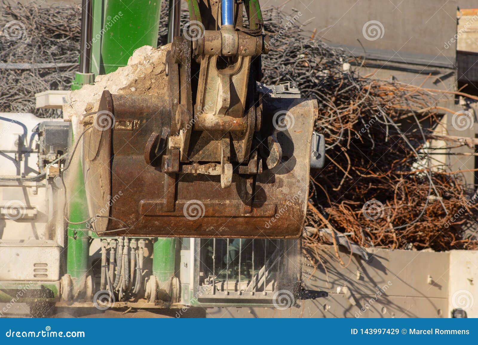 Excavator bucket in action stock image. Image of close - 143997429