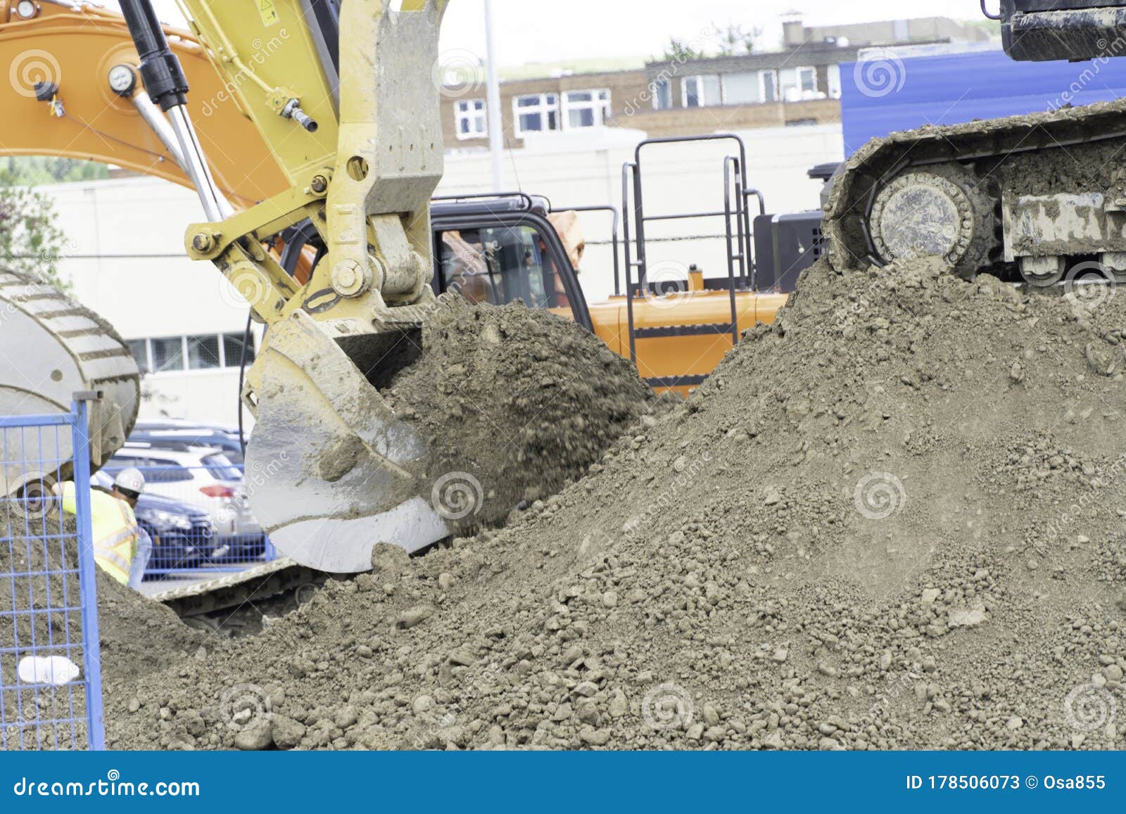 Excavator Bucket Clearing Sand Soil at Construction Site Stock Image ...