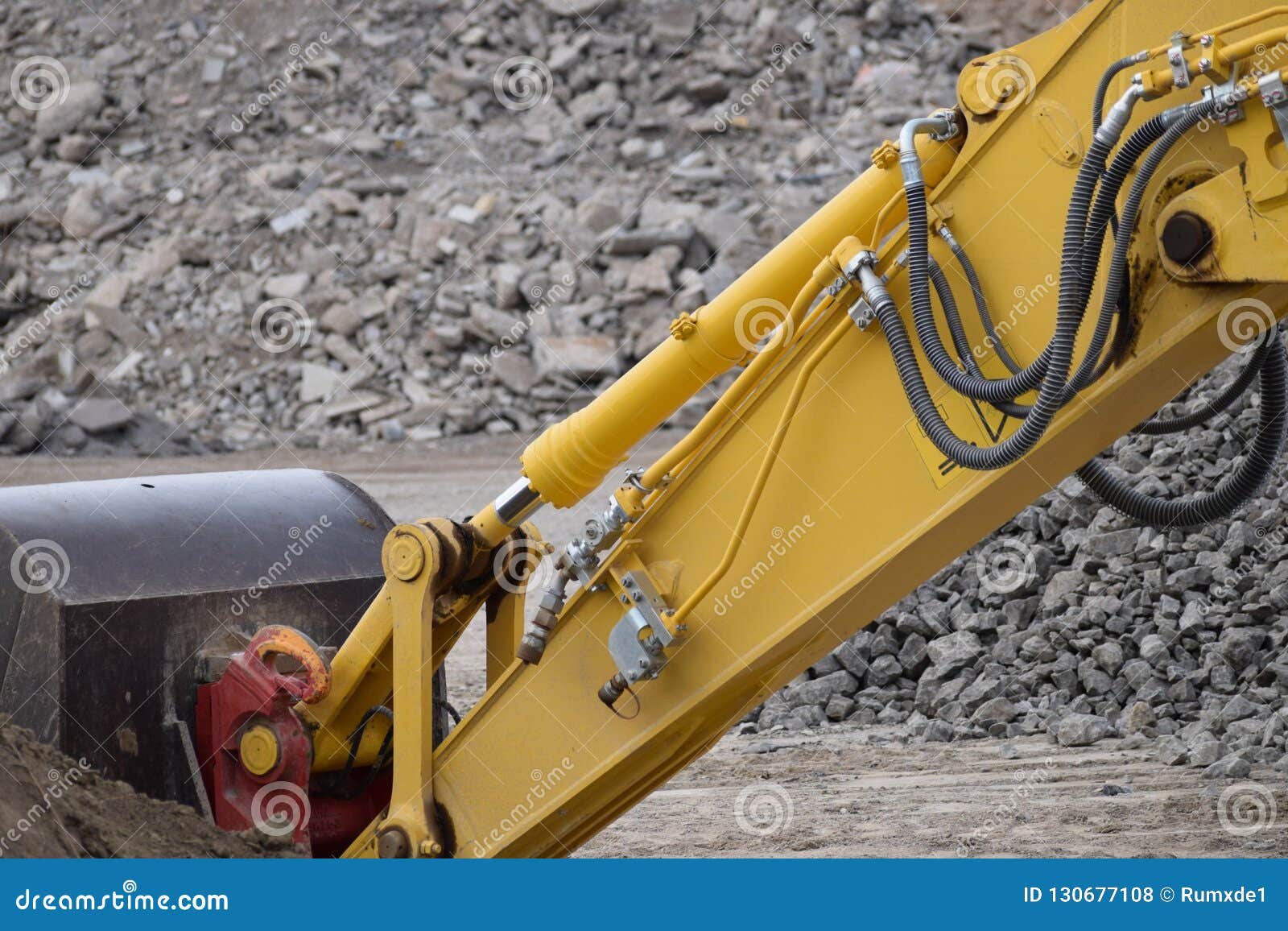 Excavator Bucket in Front of a Construction Area Stock Photo - Image of ...