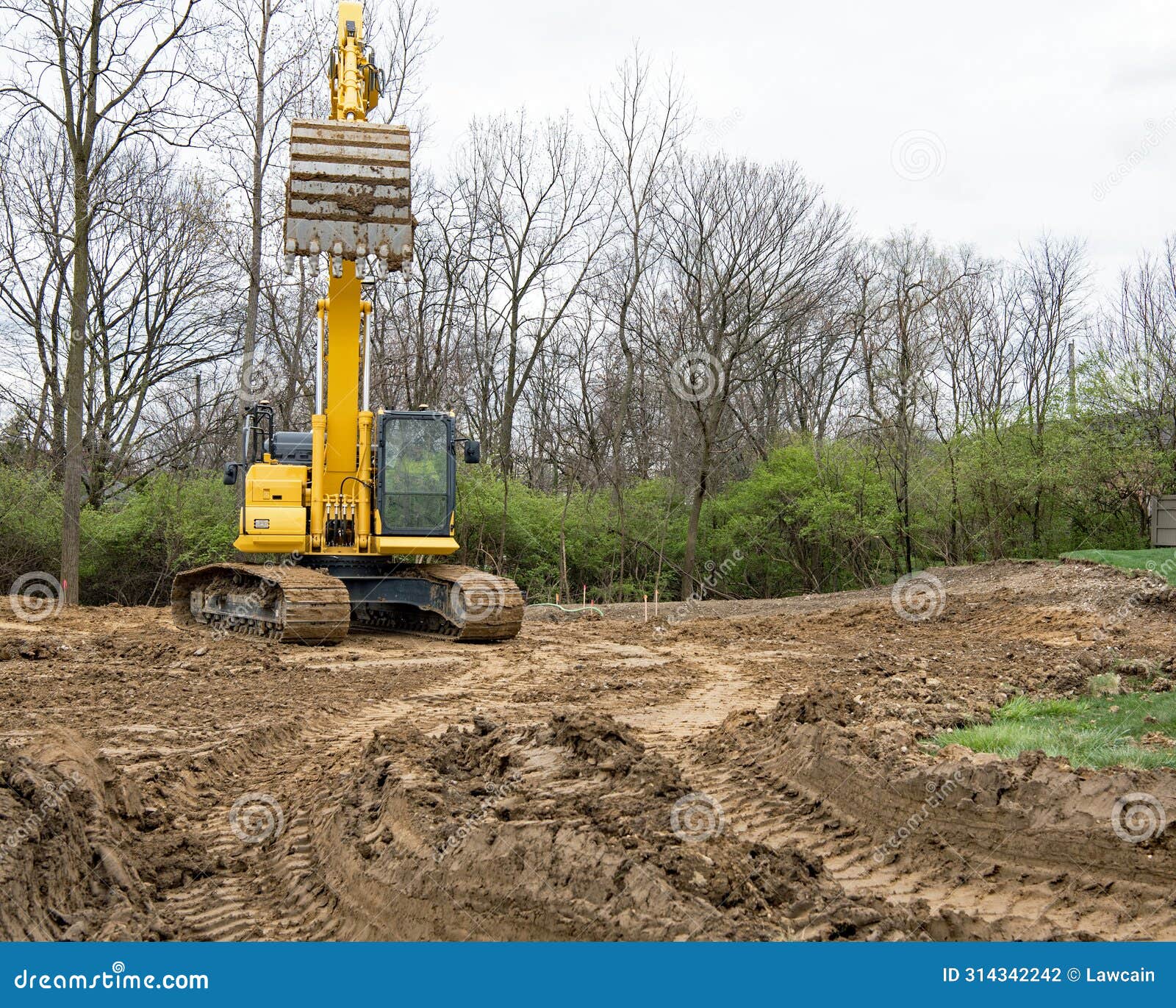 Excavator Bucket Lowering To Scoop Dirt Stock Photo - Image of nature ...