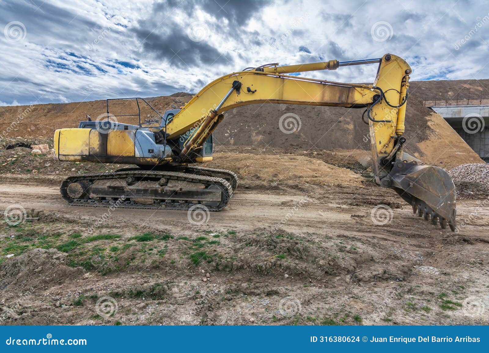 Excavator Building a Road in a Site Construction Stock Photo - Image of ...