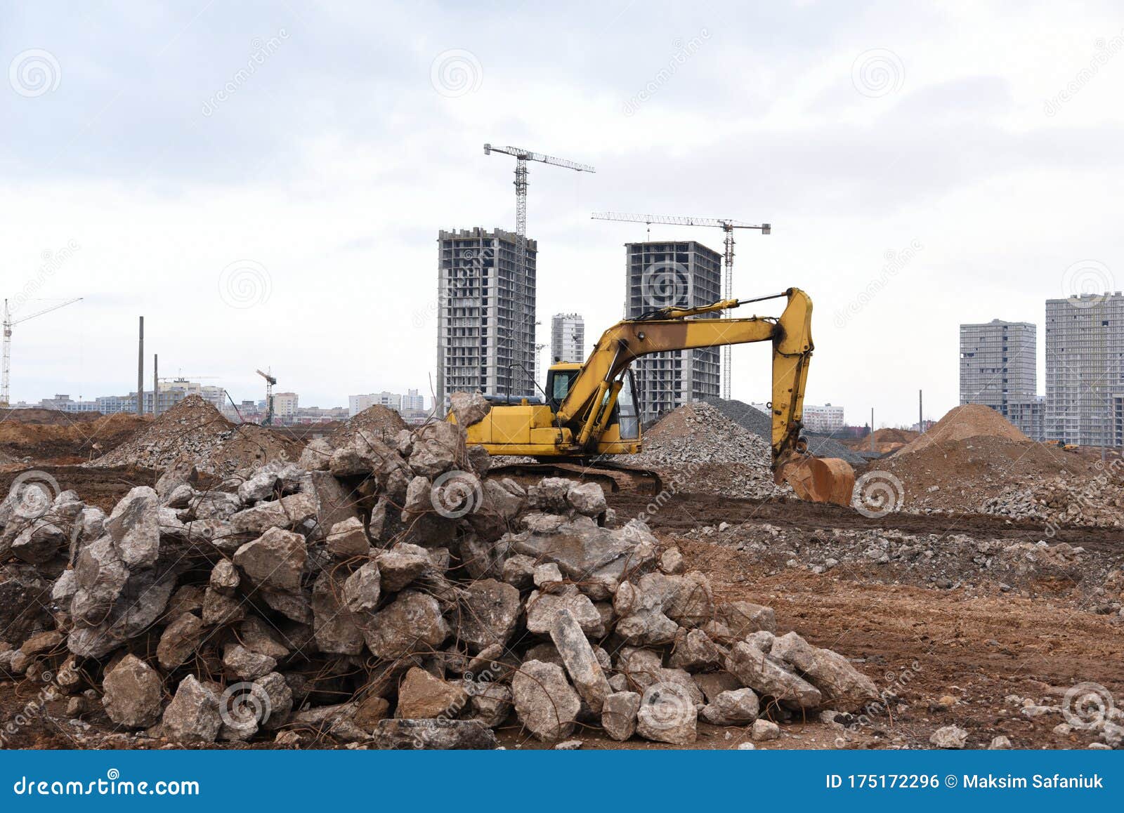 Excavator at Building Under Construction. Backhoe Digs the Ground for ...