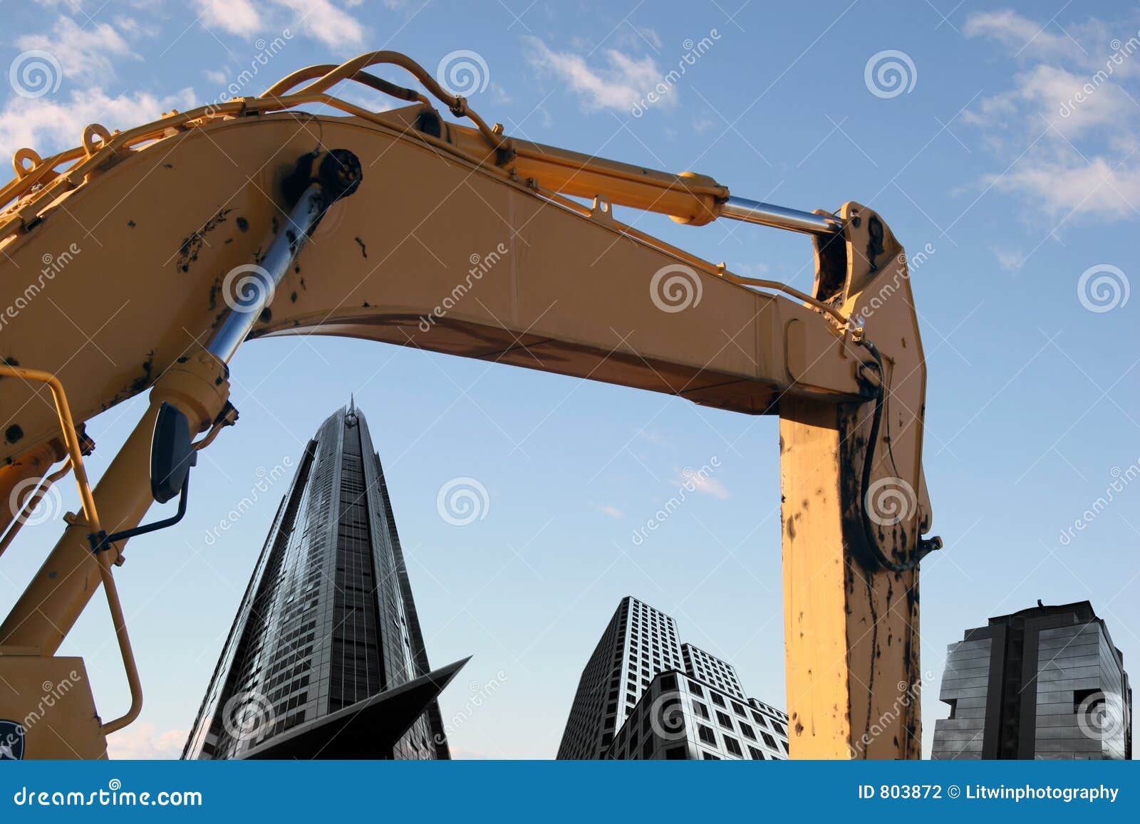 Excavator and buildings stock photo. Image of bucketloader - 803872
