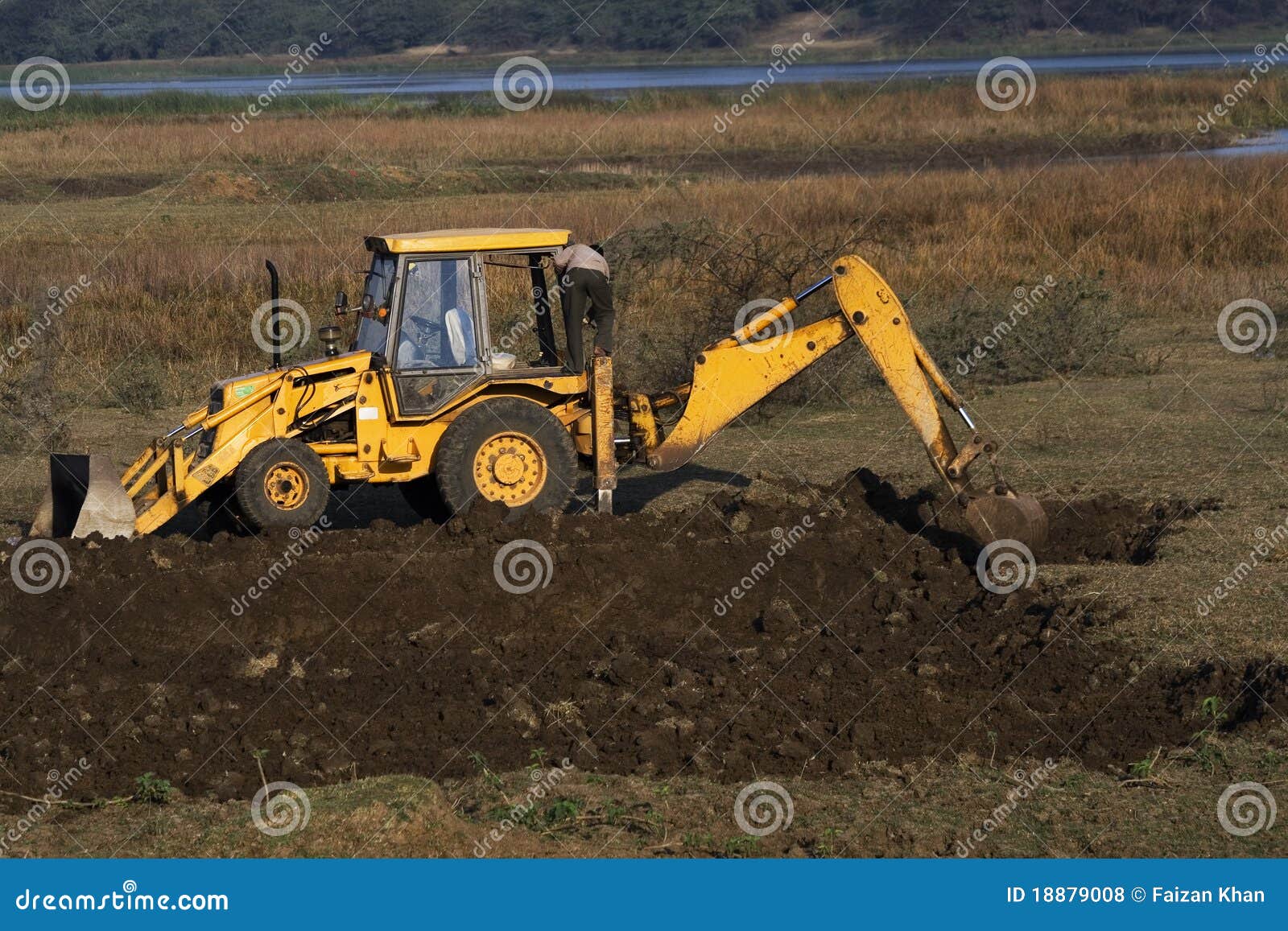 An Excavator or Bulldozer Digging the Ground Stock Photo - Image of ...