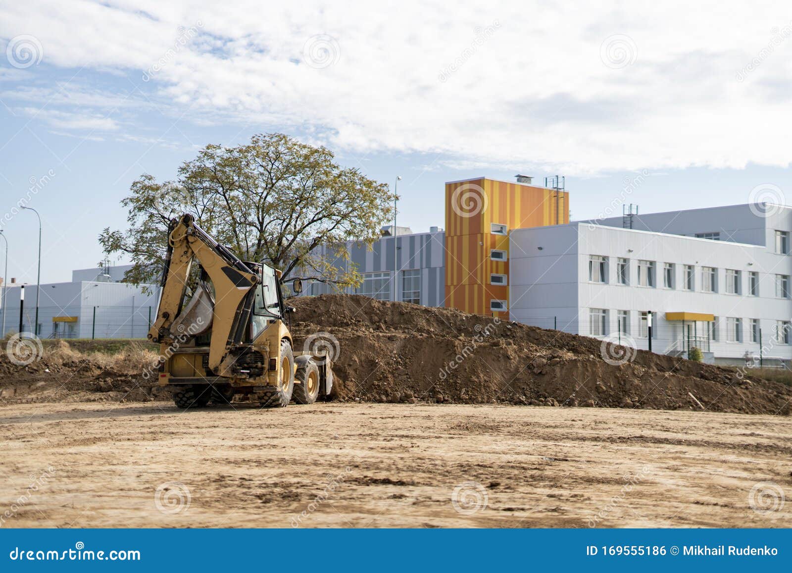 Excavator Bulldozer Machine Working To Build The New Apartment Complex ...