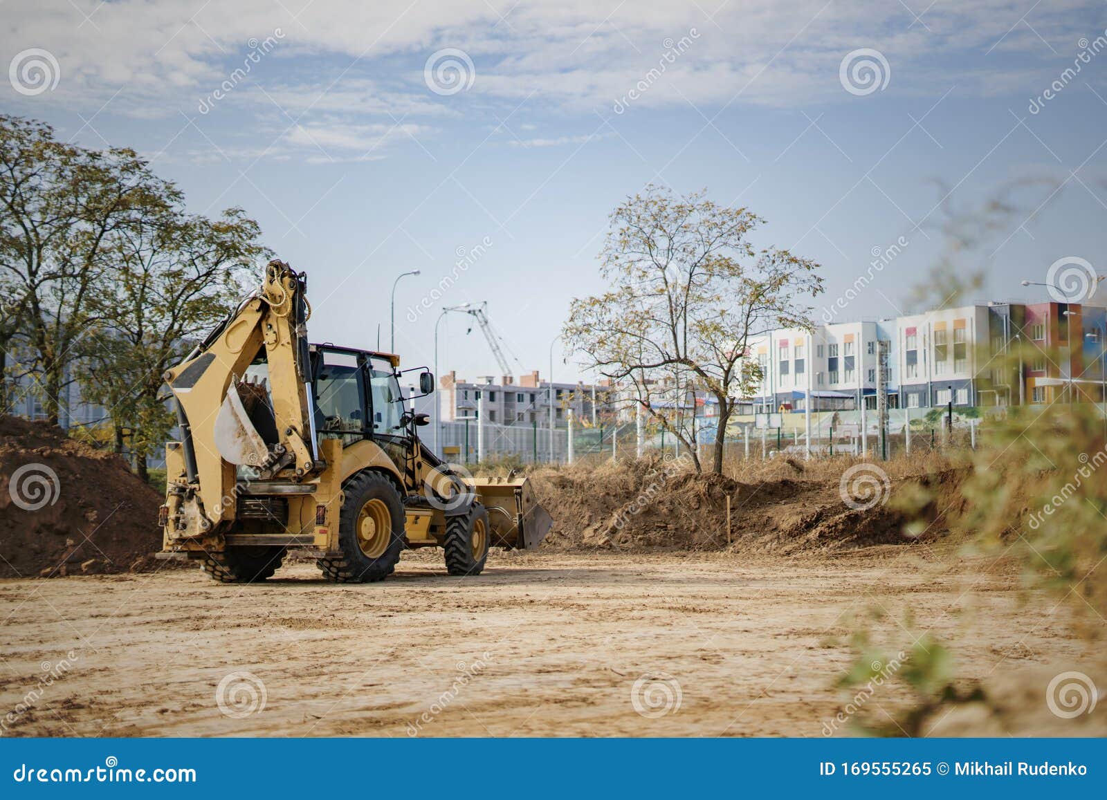 Excavator Bulldozer Machine Working To Build the New Apartment Complex ...