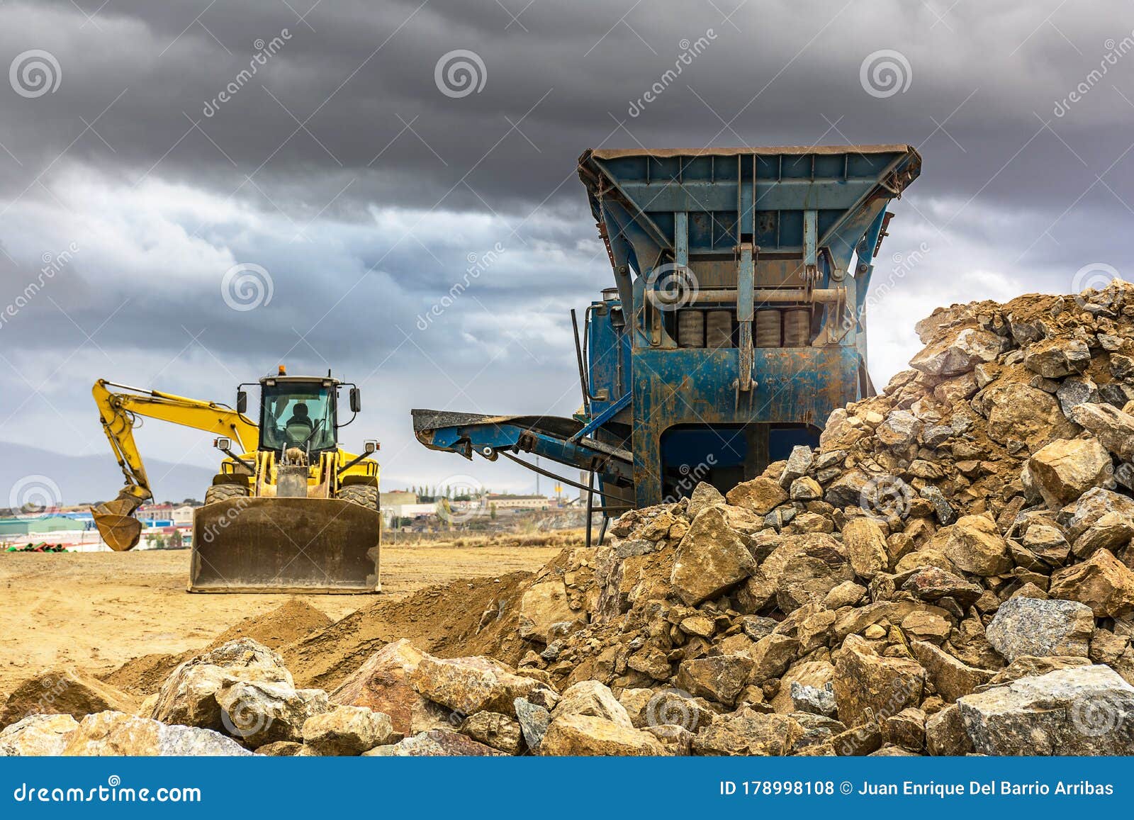 Excavator Collecting Stone in an Open-cast Mine Stock Photo - Image of ...