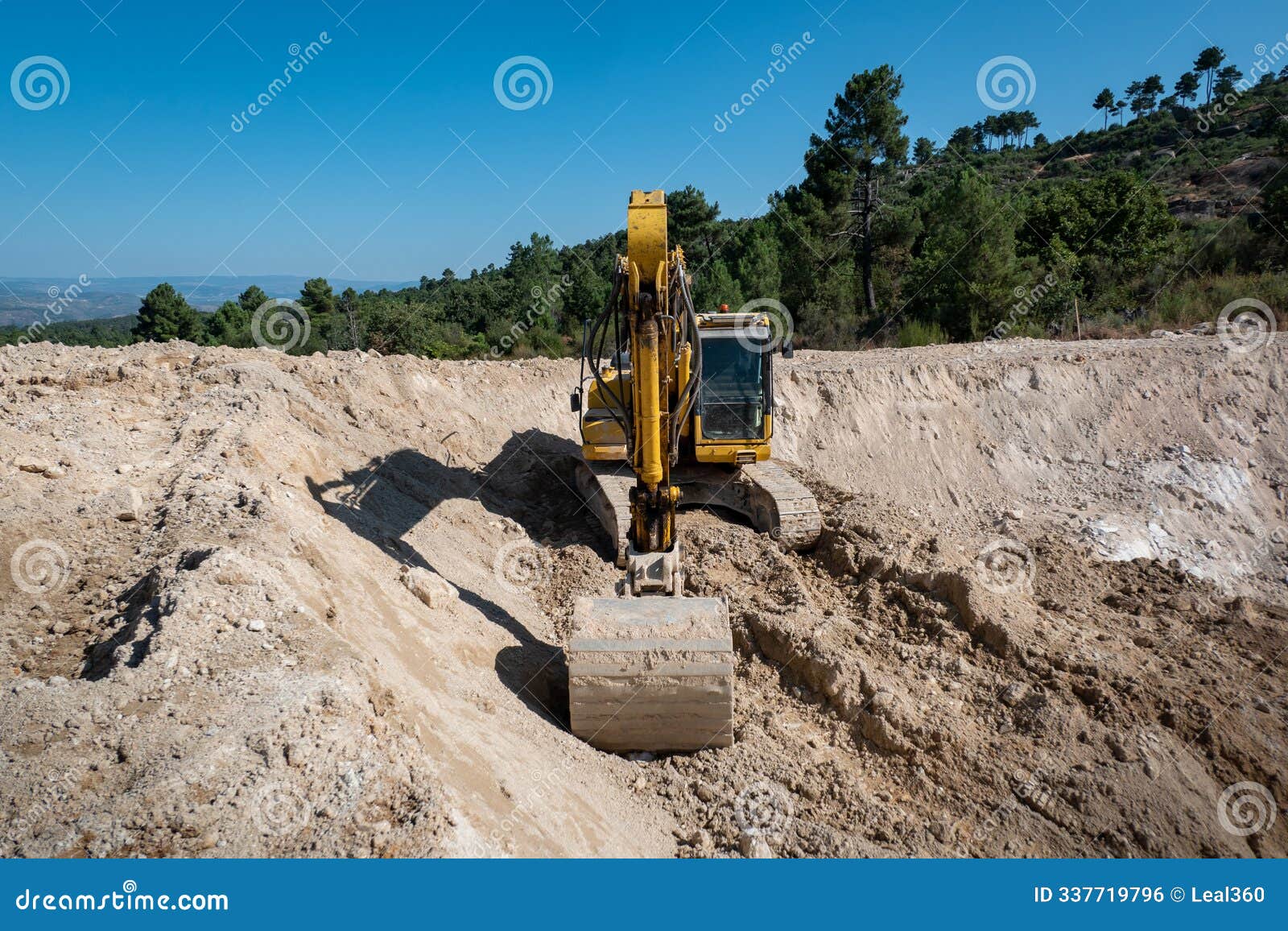 Excavator in the Construction of a Pond or Dam Stock Photo - Image of ...