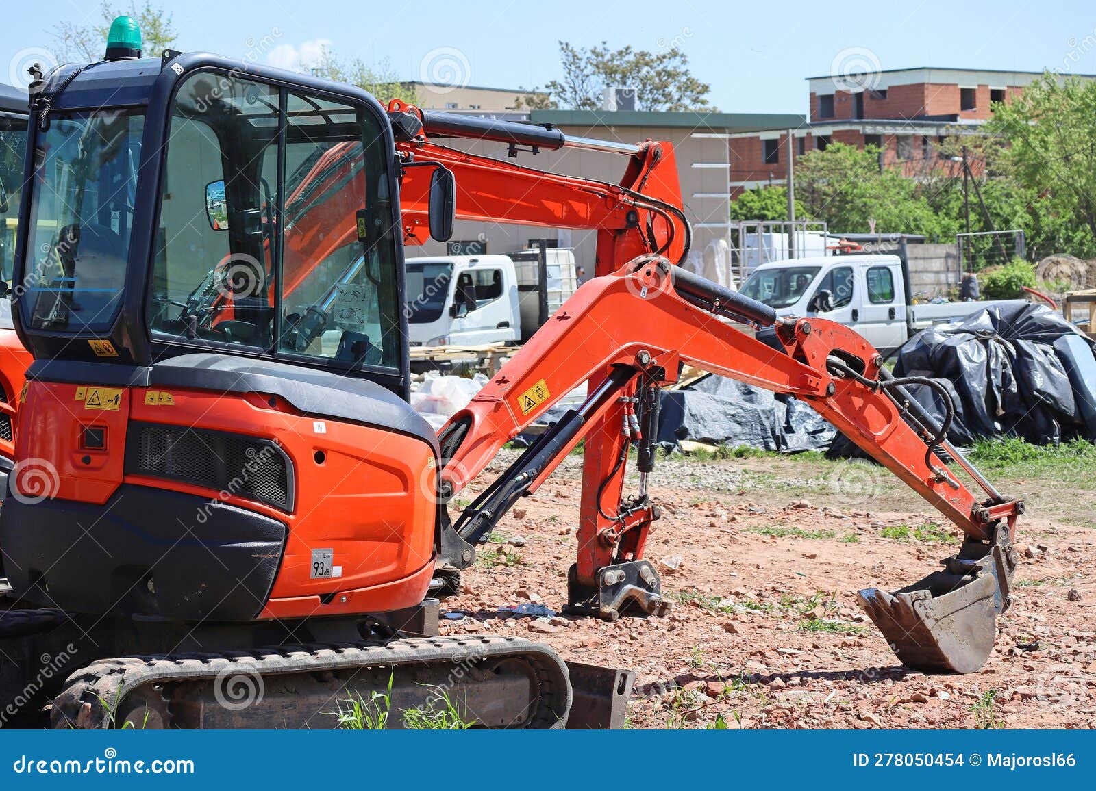 Excavator at the Construction Site Stock Photo - Image of brick ...