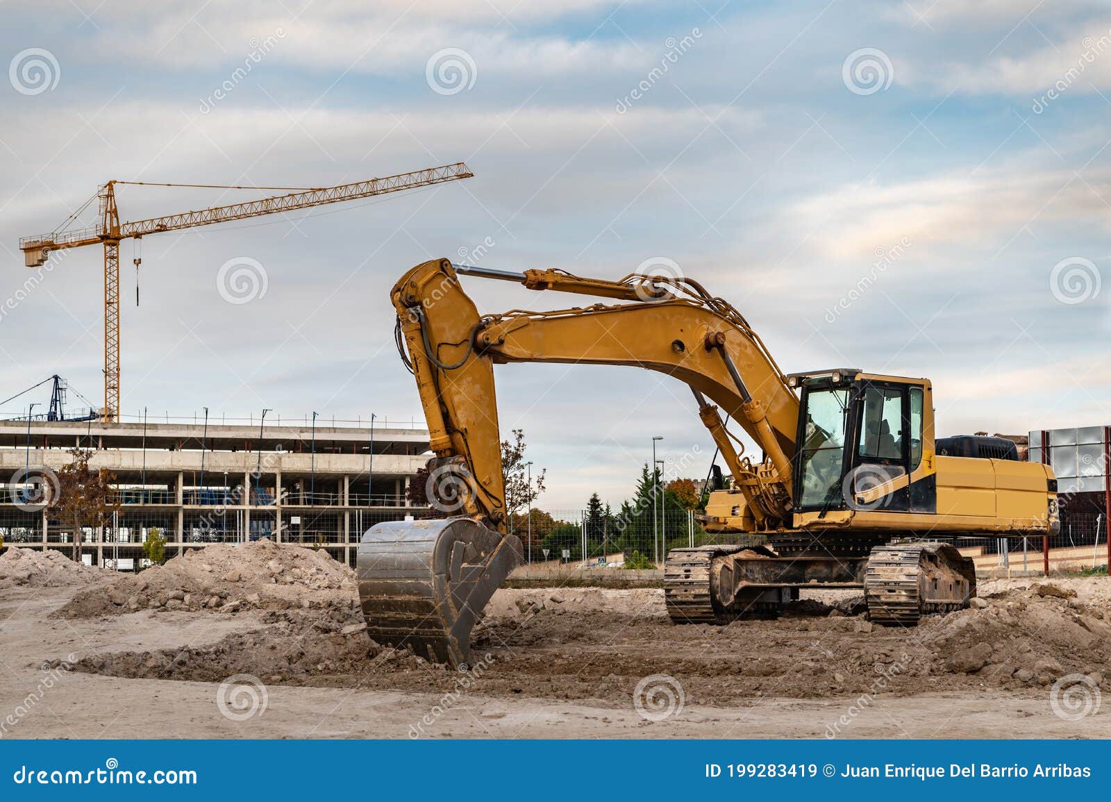 Excavator at a Construction Site with Cranes Stock Image - Image of ...