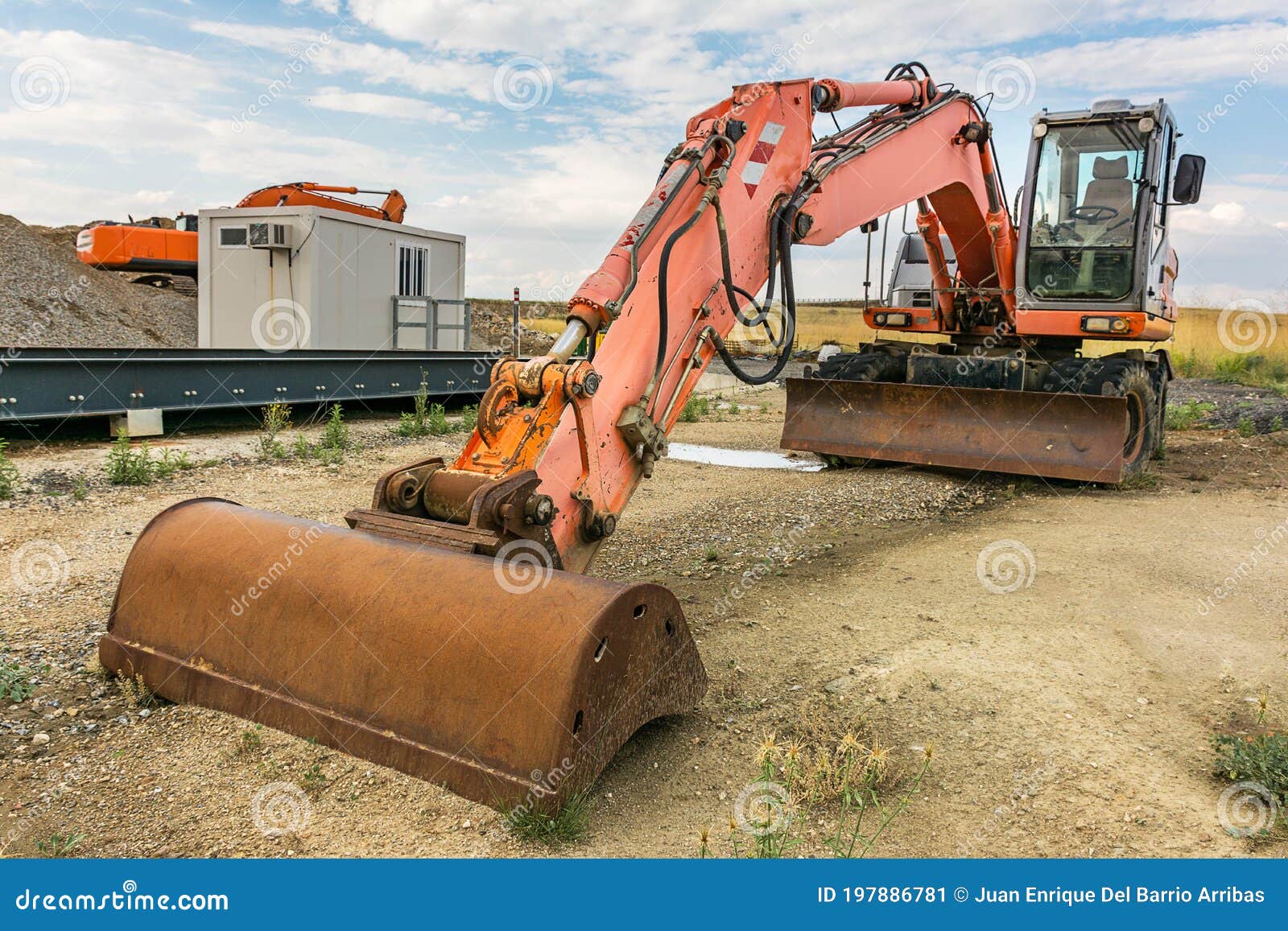 Excavator at a Construction Site Developing Earth Moving Work Stock ...