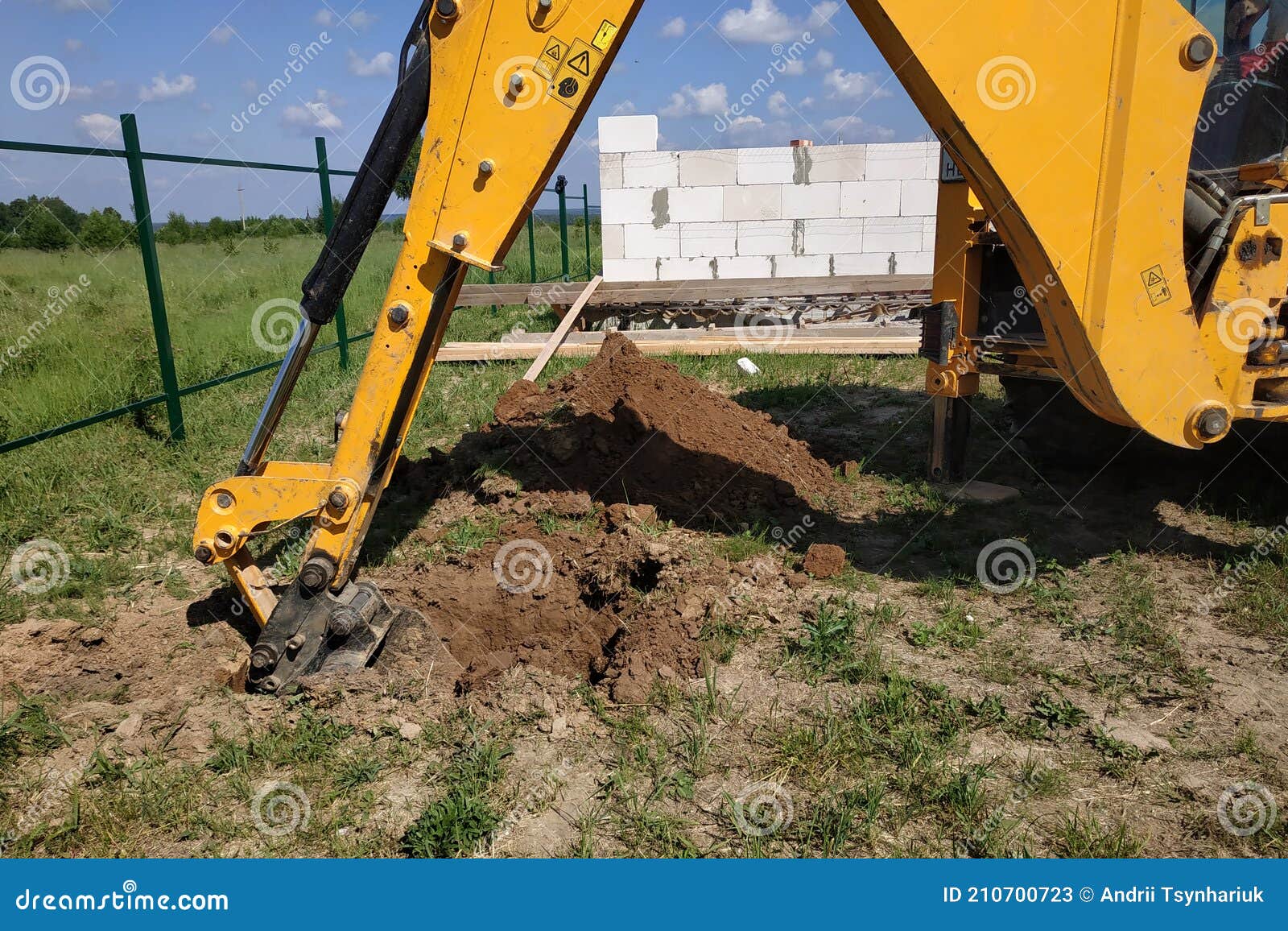 Excavator on a Construction Site Digs Ditches, the Process of Work ...
