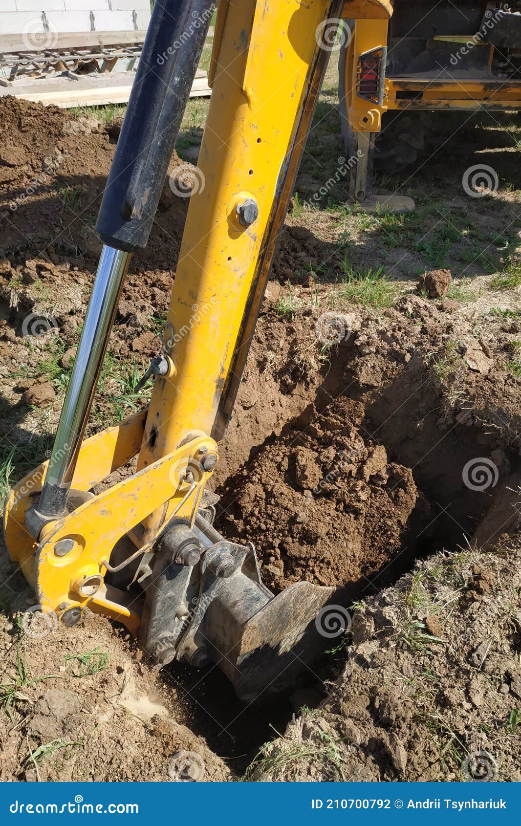 Excavator on a Construction Site Digs Ditches, the Process of Work ...