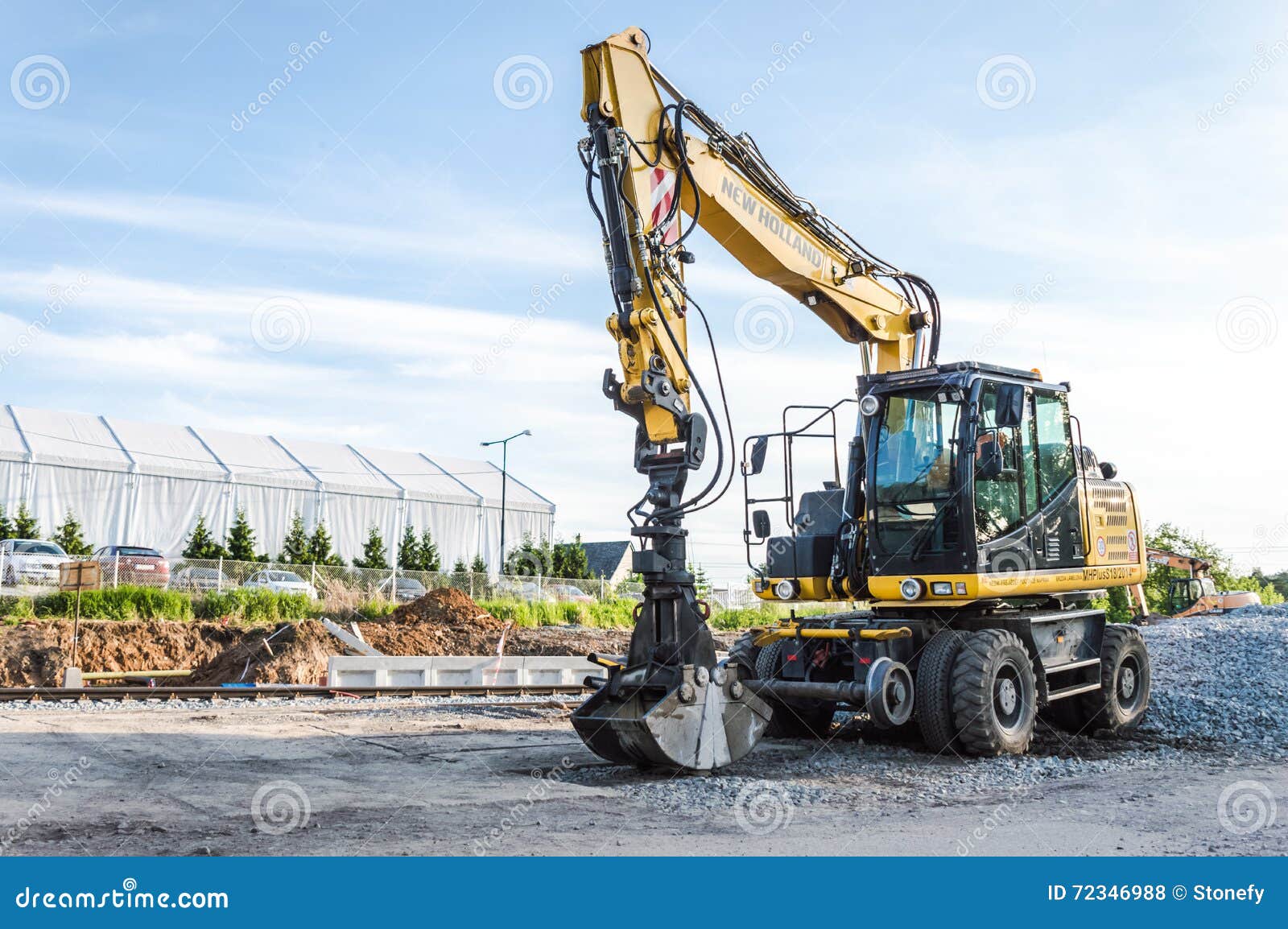 Excavator at a Construction Site Editorial Stock Photo - Image of dozer ...
